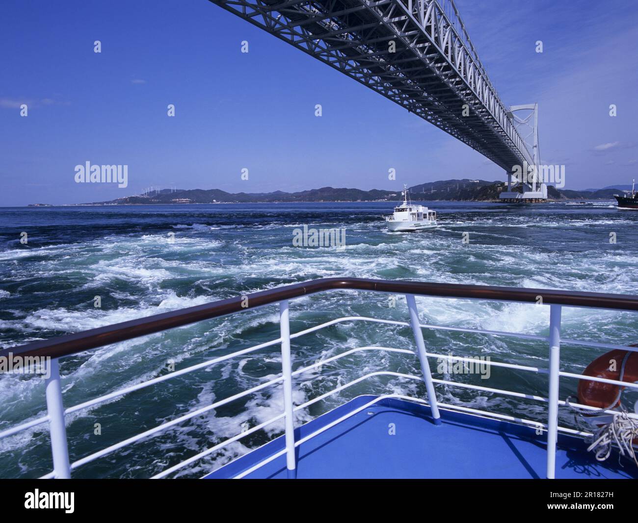 Naruto whirlpools, tourist ship and ?naruto Bridge Stock Photo - Alamy