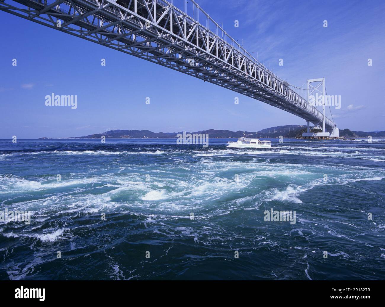 Naruto whirlpools, tourist ship and ?naruto Bridge Stock Photo - Alamy