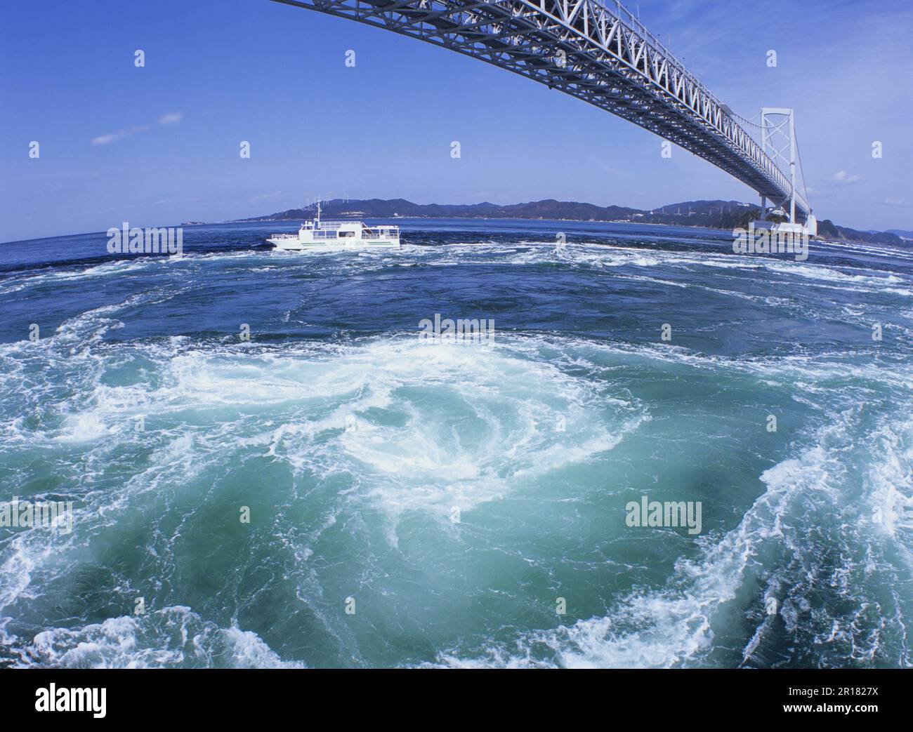 Naruto whirlpools, tourist ship and ?naruto Bridge Stock Photo - Alamy
