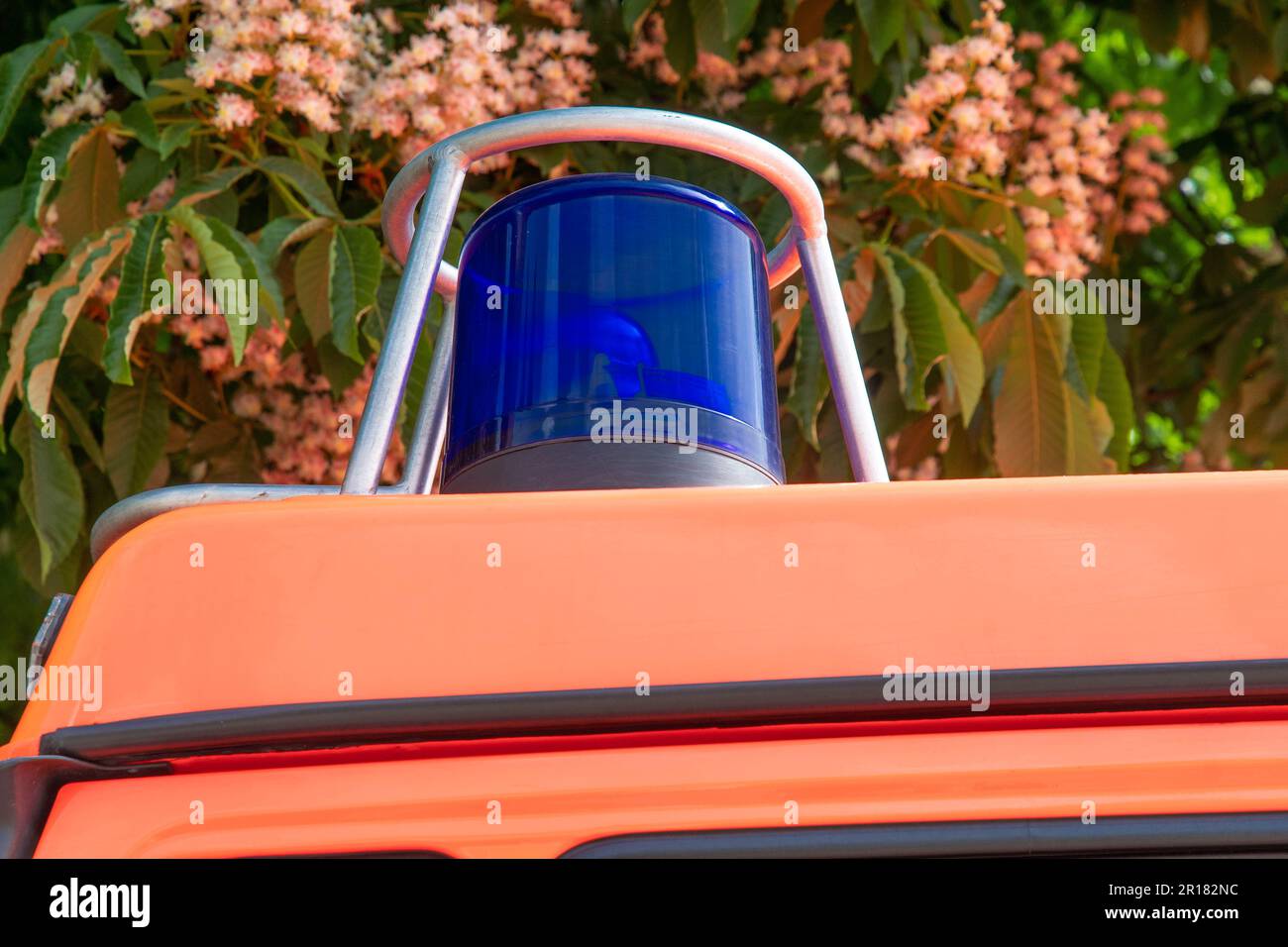 Blue light on a fire brigade emergency vehicle with grille Stock Photo ...