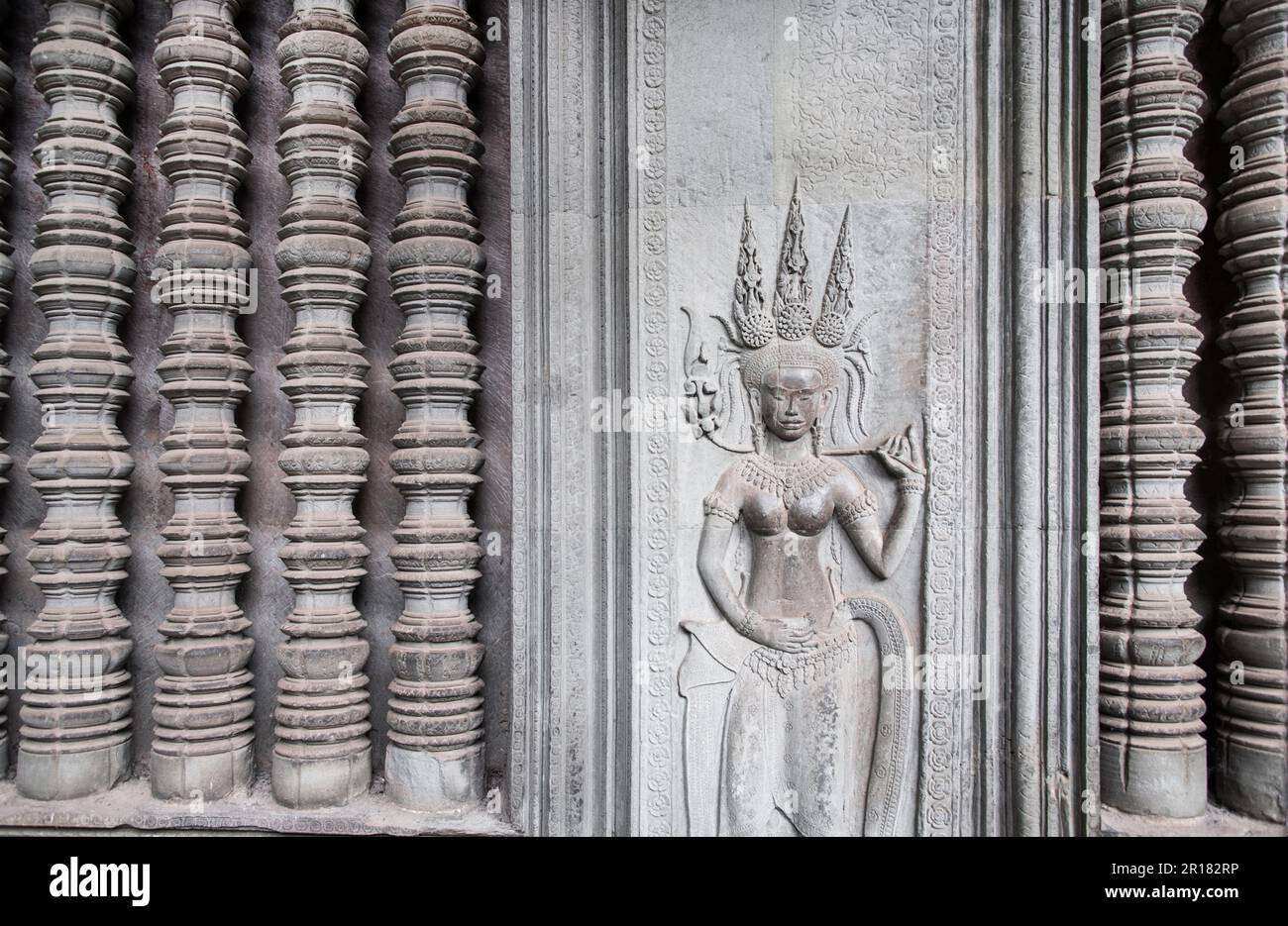 Detail of stone carvings of Apsara is a beautiful and seductive girl of ...