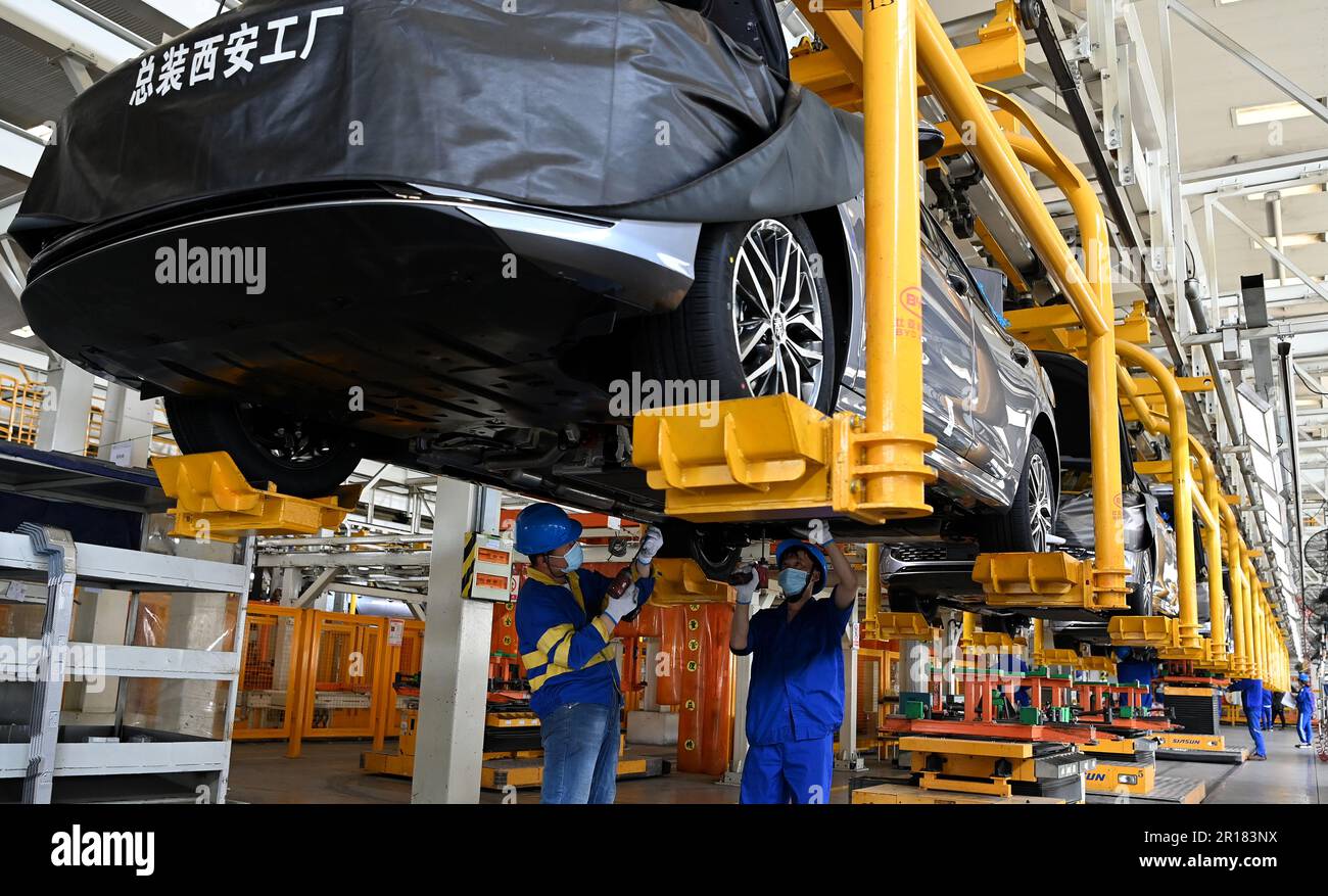 Xi'an, China's Shaanxi Province. 20th Apr, 2022. Staff members assemble ...