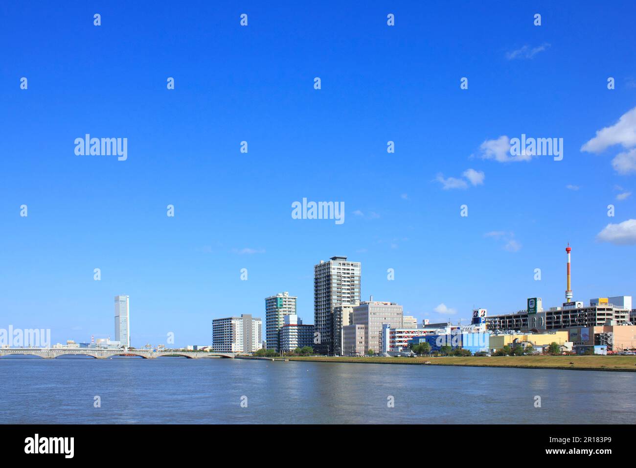 Toki Messe and Mandai Bridge spanning the Shinano River Stock Photo - Alamy