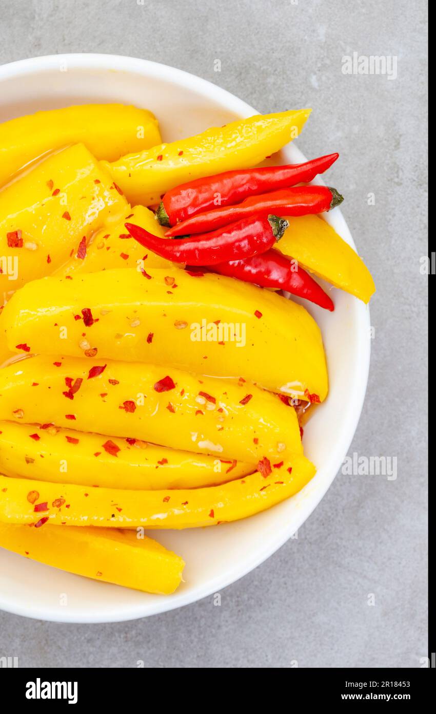 Mango, Chili and honey salad on mottled grey Stock Photo - Alamy