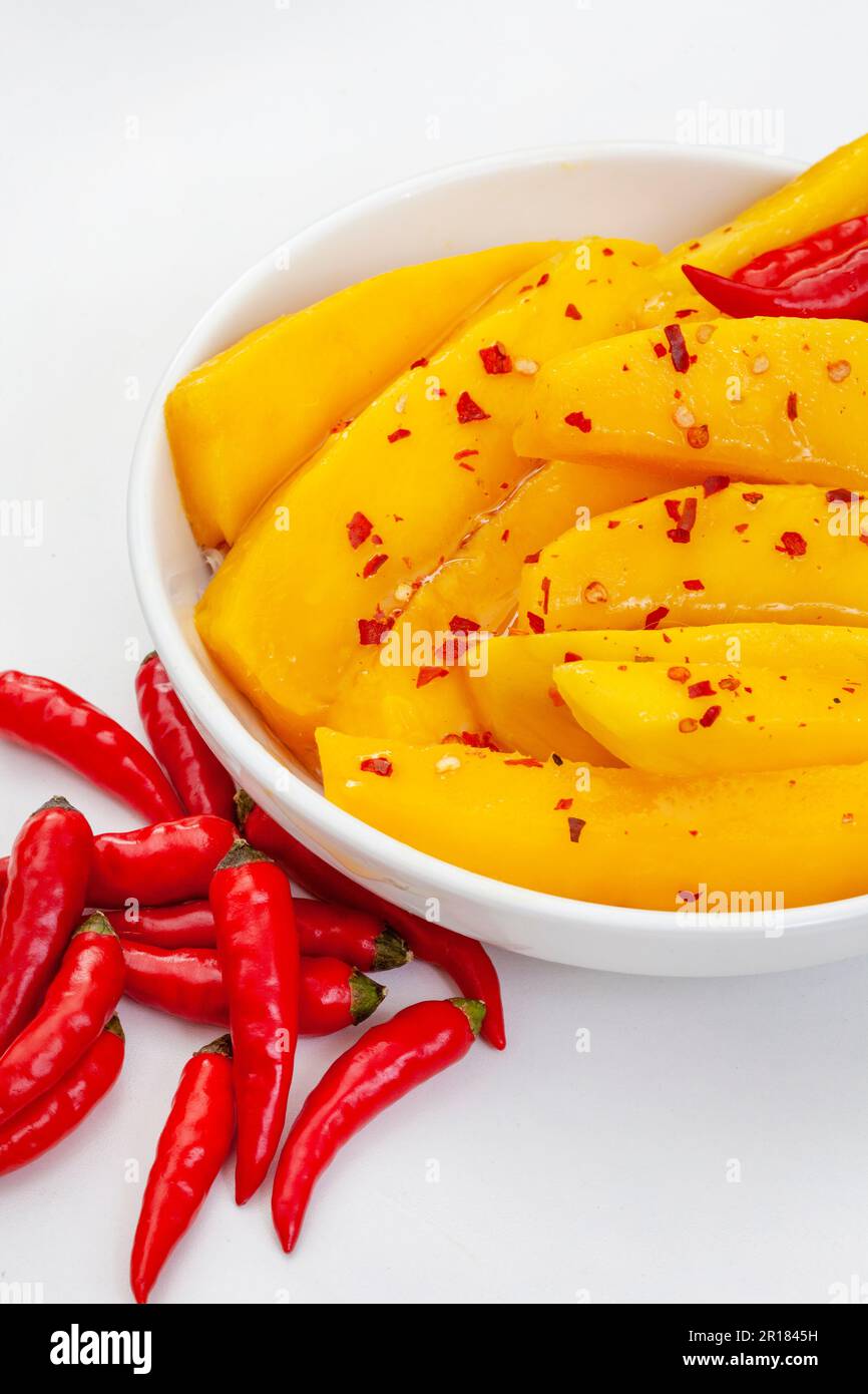 Mango, Chili and honey salad on white Stock Photo - Alamy