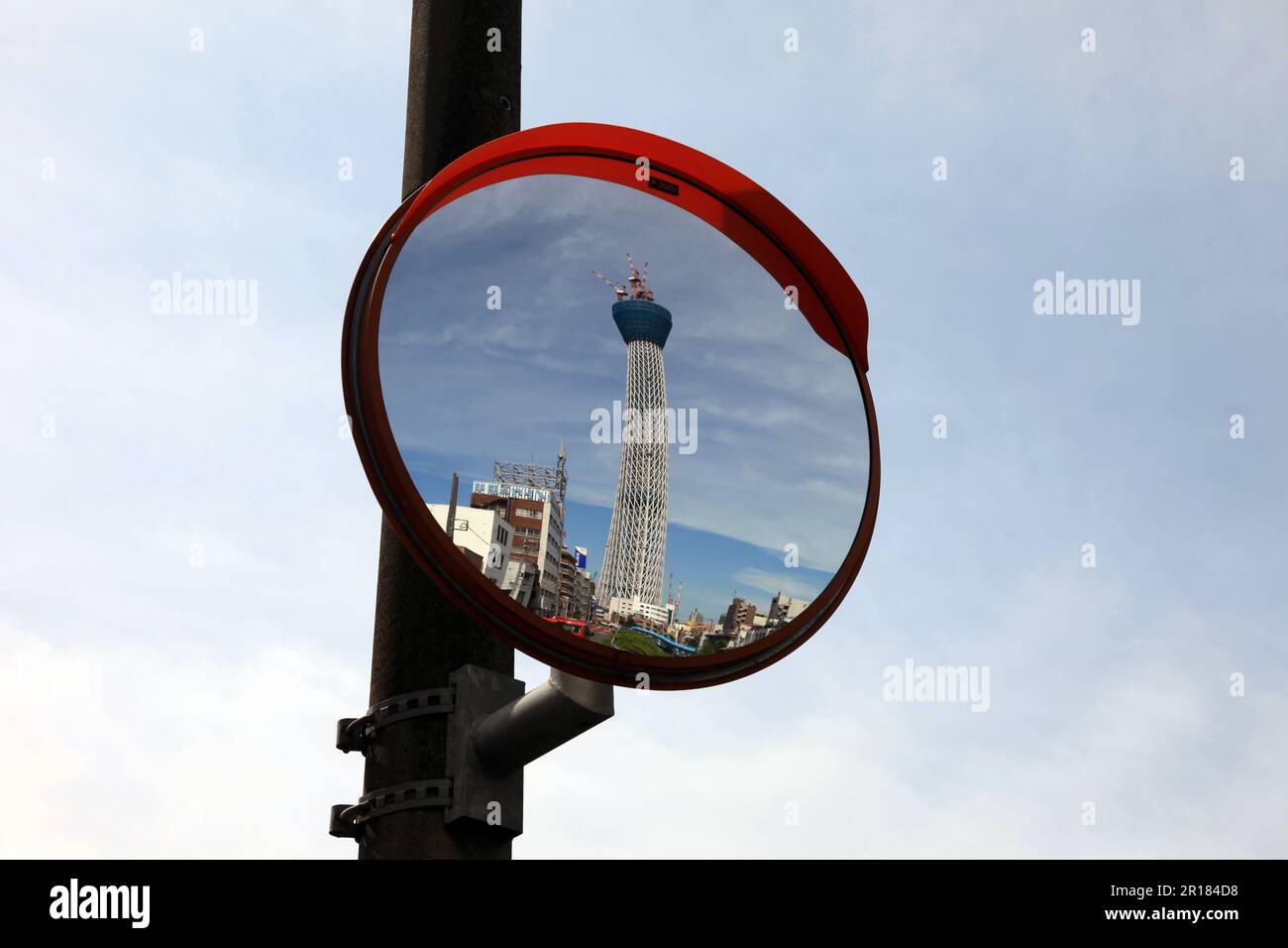Tokyo sky tree reflected in the curved mirror Stock Photo - Alamy