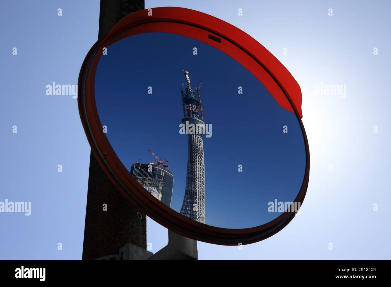 Tokyo sky tree reflected in the curved mirror Stock Photo - Alamy