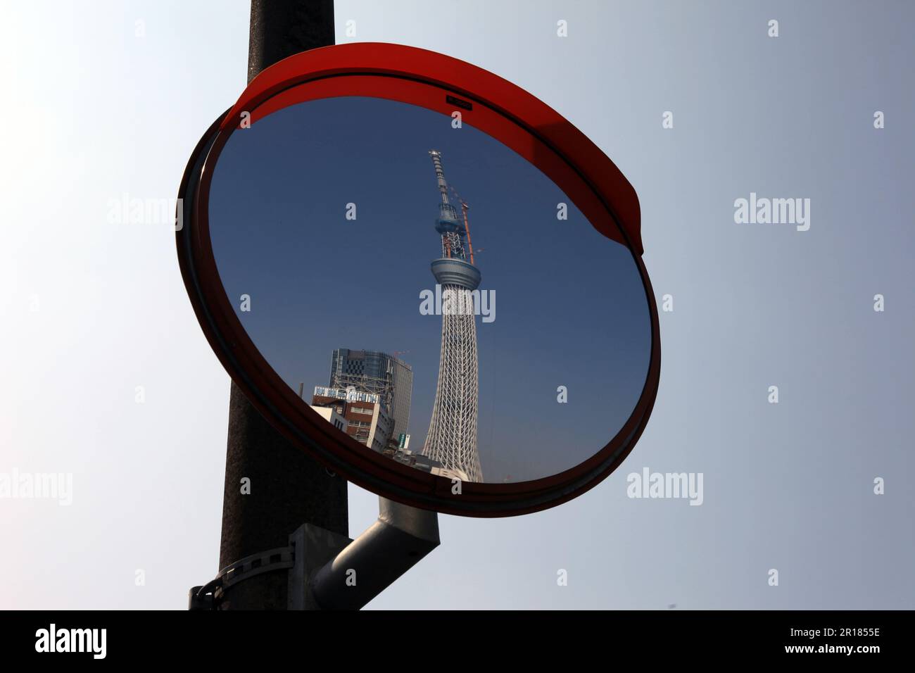 Tokyo sky tree reflected in the curved mirror Stock Photo - Alamy