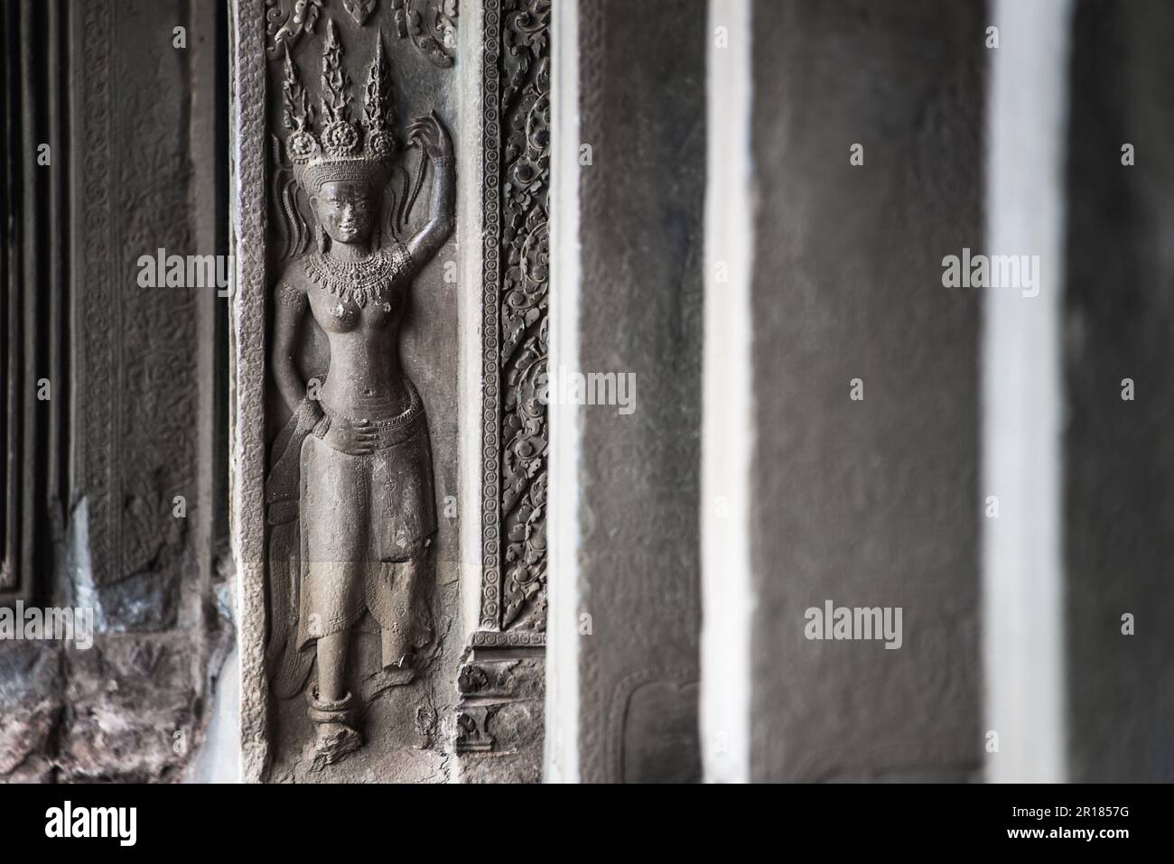 Detail of stone carvings of Apsara is a beautiful and seductive girl of ...