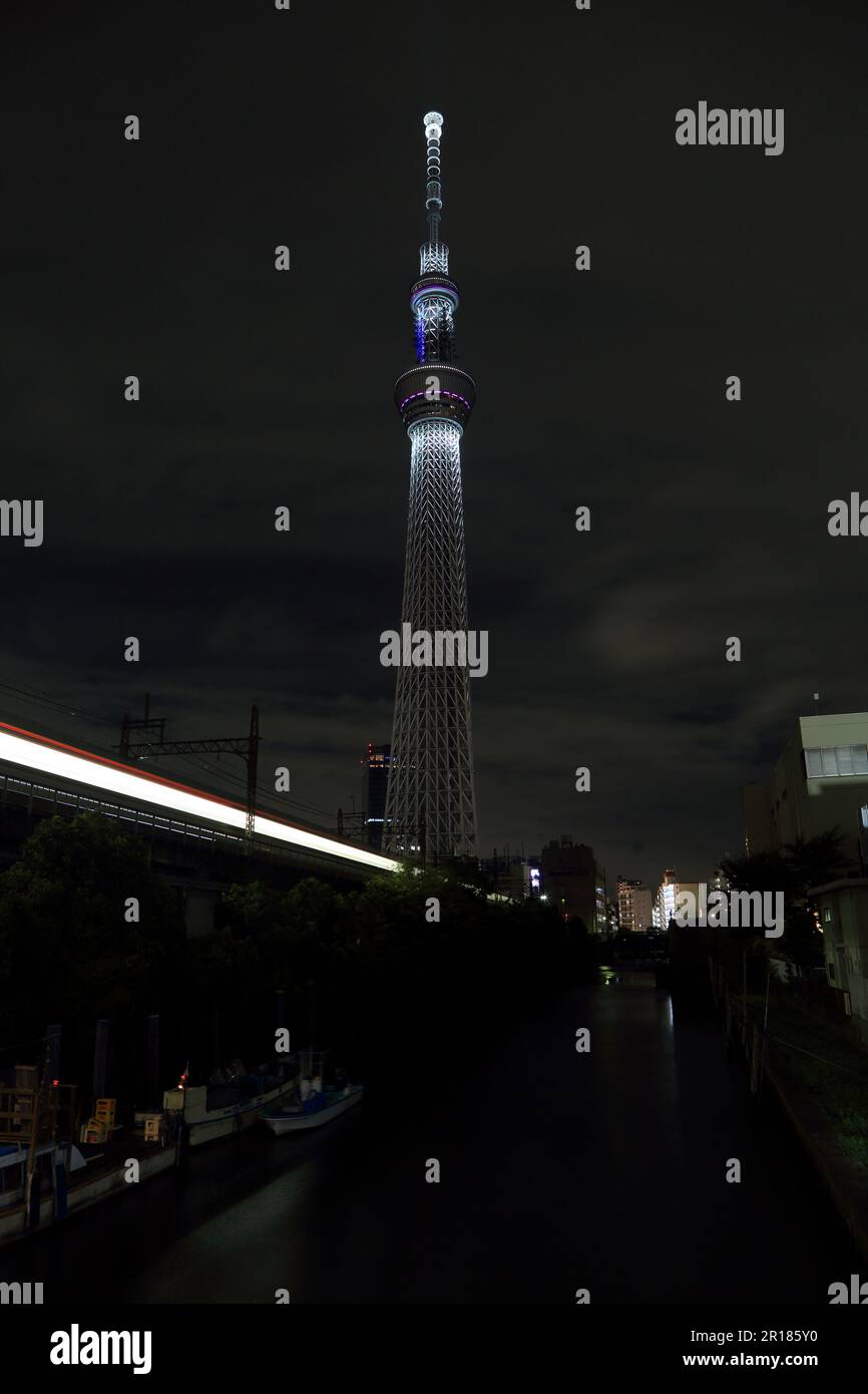 Tokyo Sky Tree was lit up in white overlooking than Minamotomori-kyo ...
