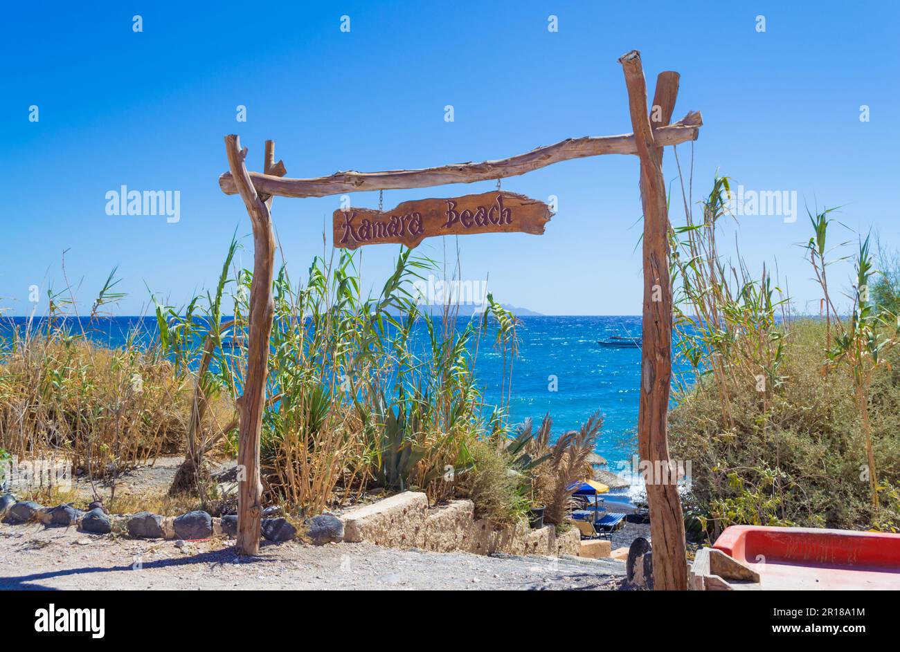 Kamari beach sign at the entrance of the Black Beach,scenic view of ...