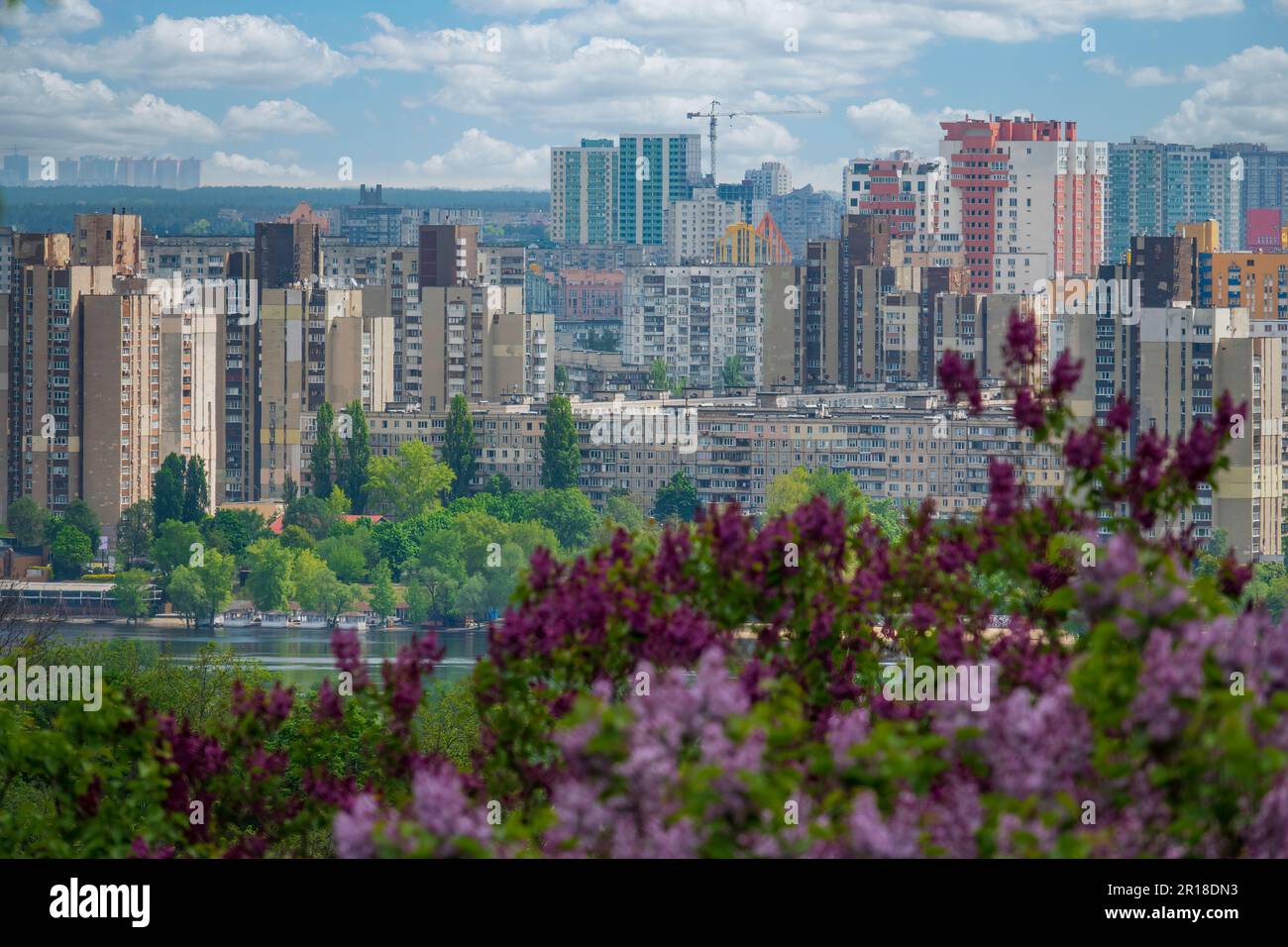 View on left bank of Kyiv city from botanic garden with blooming lilac ...