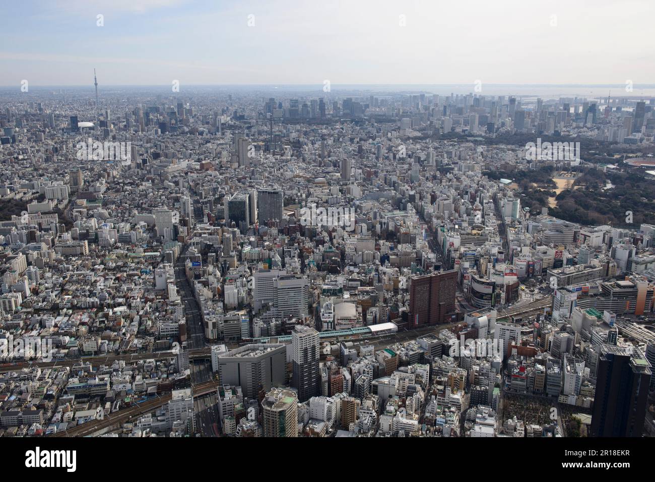 Seibu Shinjuku Station aerial shot from the West side towards the sky ...