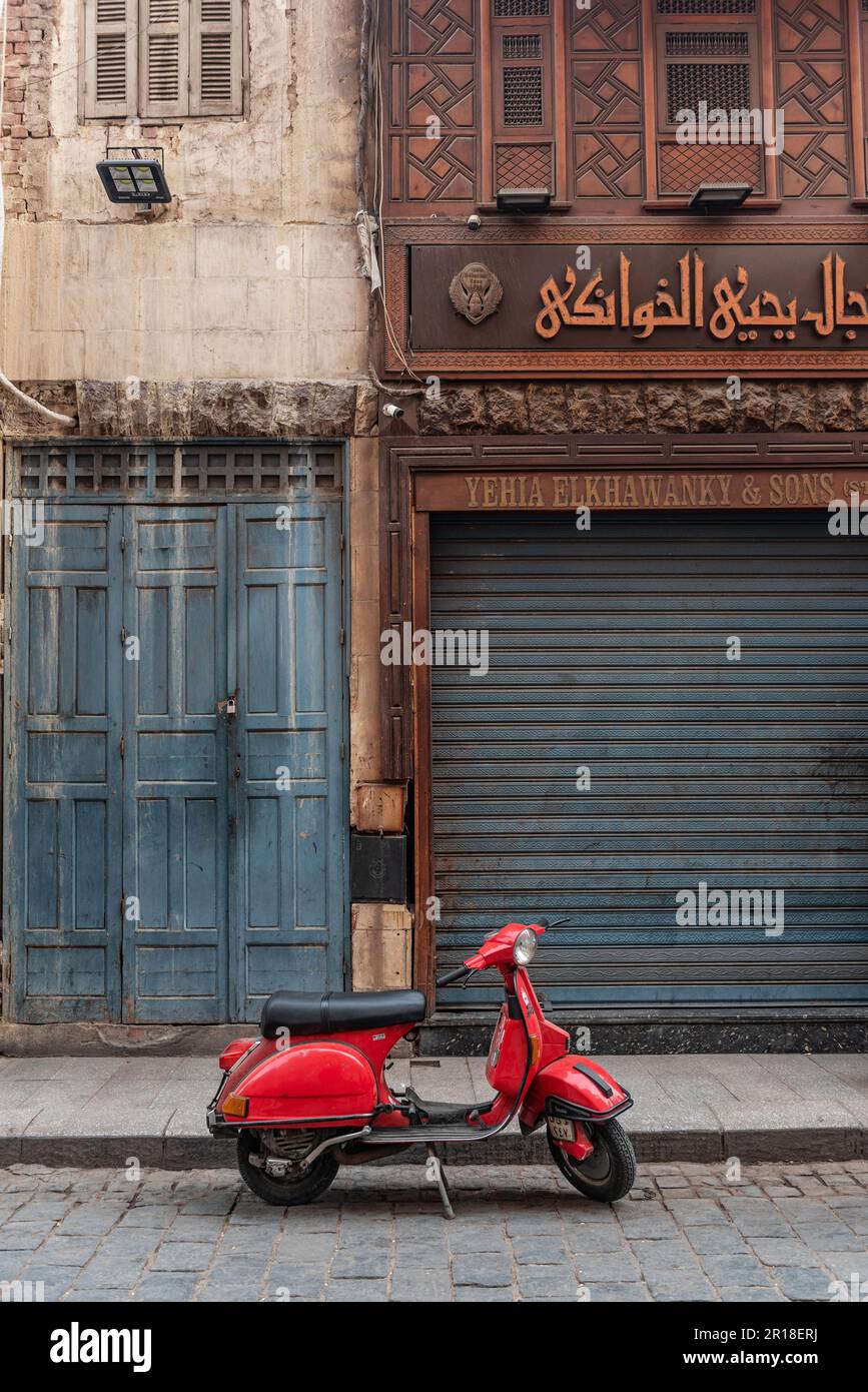 Cairo, Egypt. 27th Nov, 2022. A red Vespa motor scooter parked in the ...