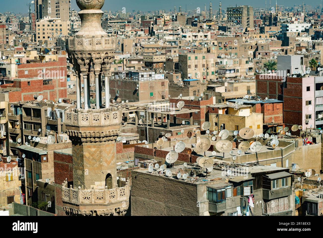 Cairo, Egypt. 29th Nov, 2022. Mosque minaret in front of crowded aerial ...