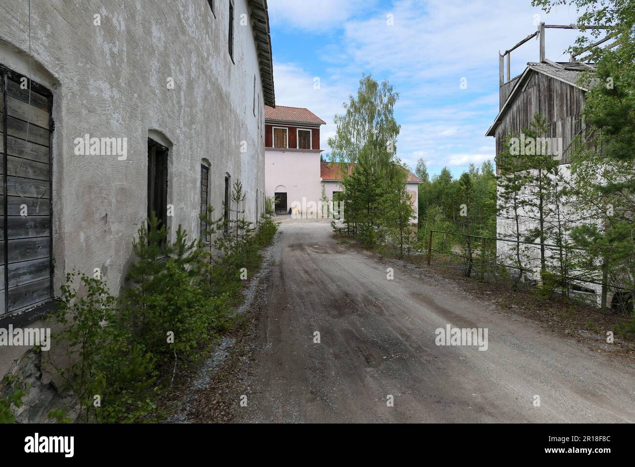 an old abandoned industrial area with buildings Stock Photo - Alamy