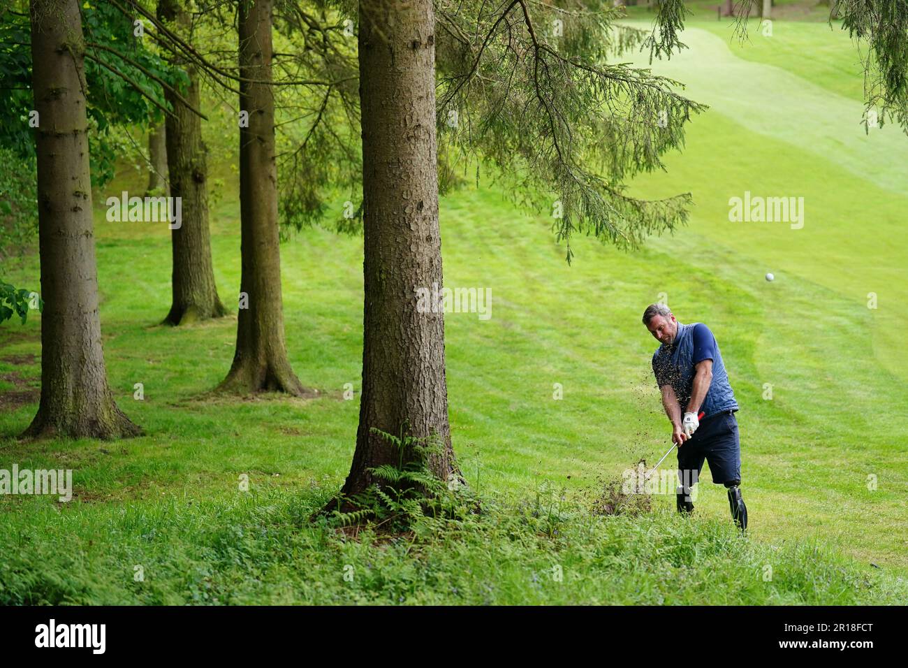 Ian Bishop plays a shot out of the rough on the 1st during day three of ...