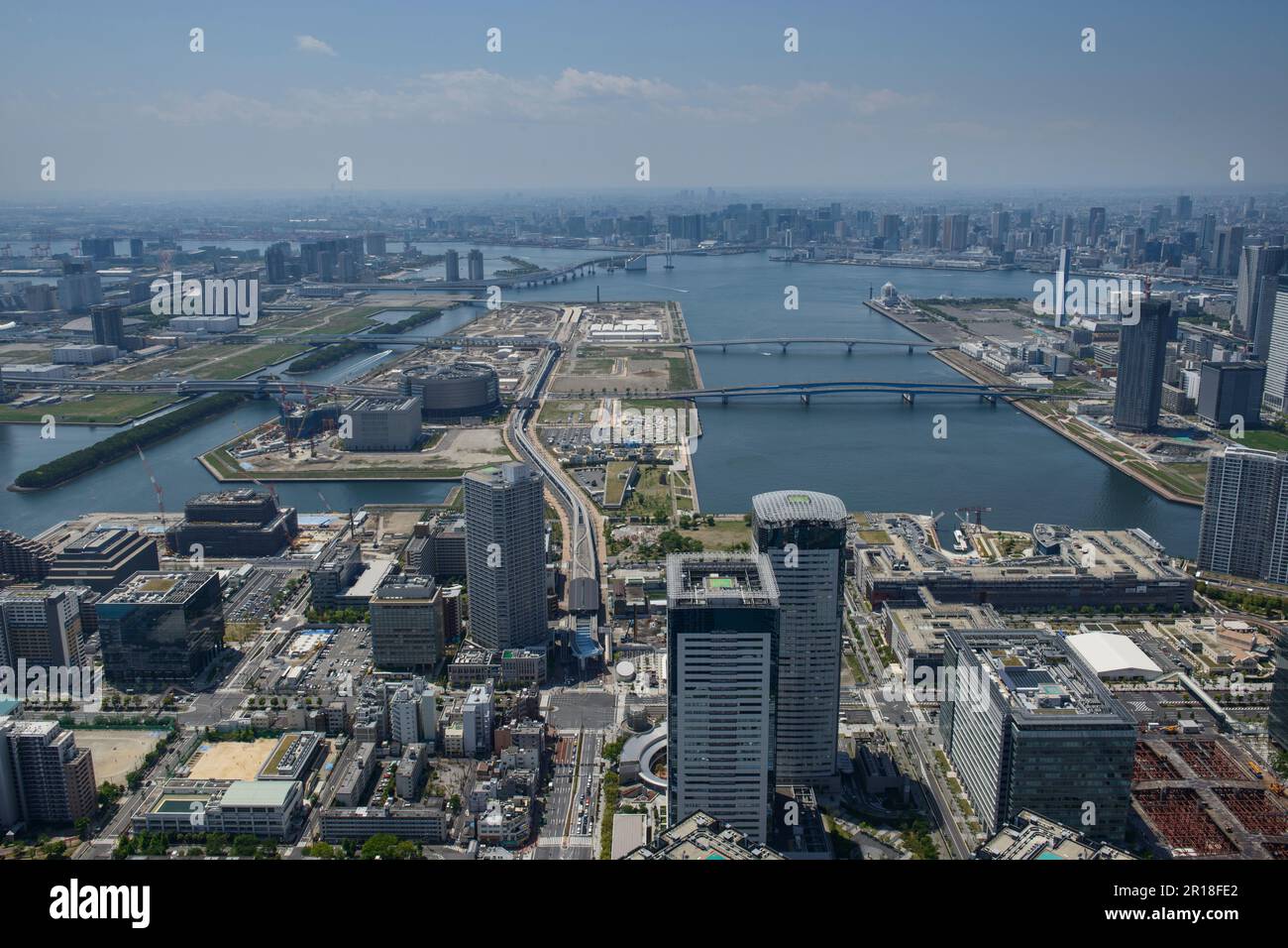 Aerial shot of Toyosu station from the northeast side towards the Rainbow Bridge/Odaiba Stock ...