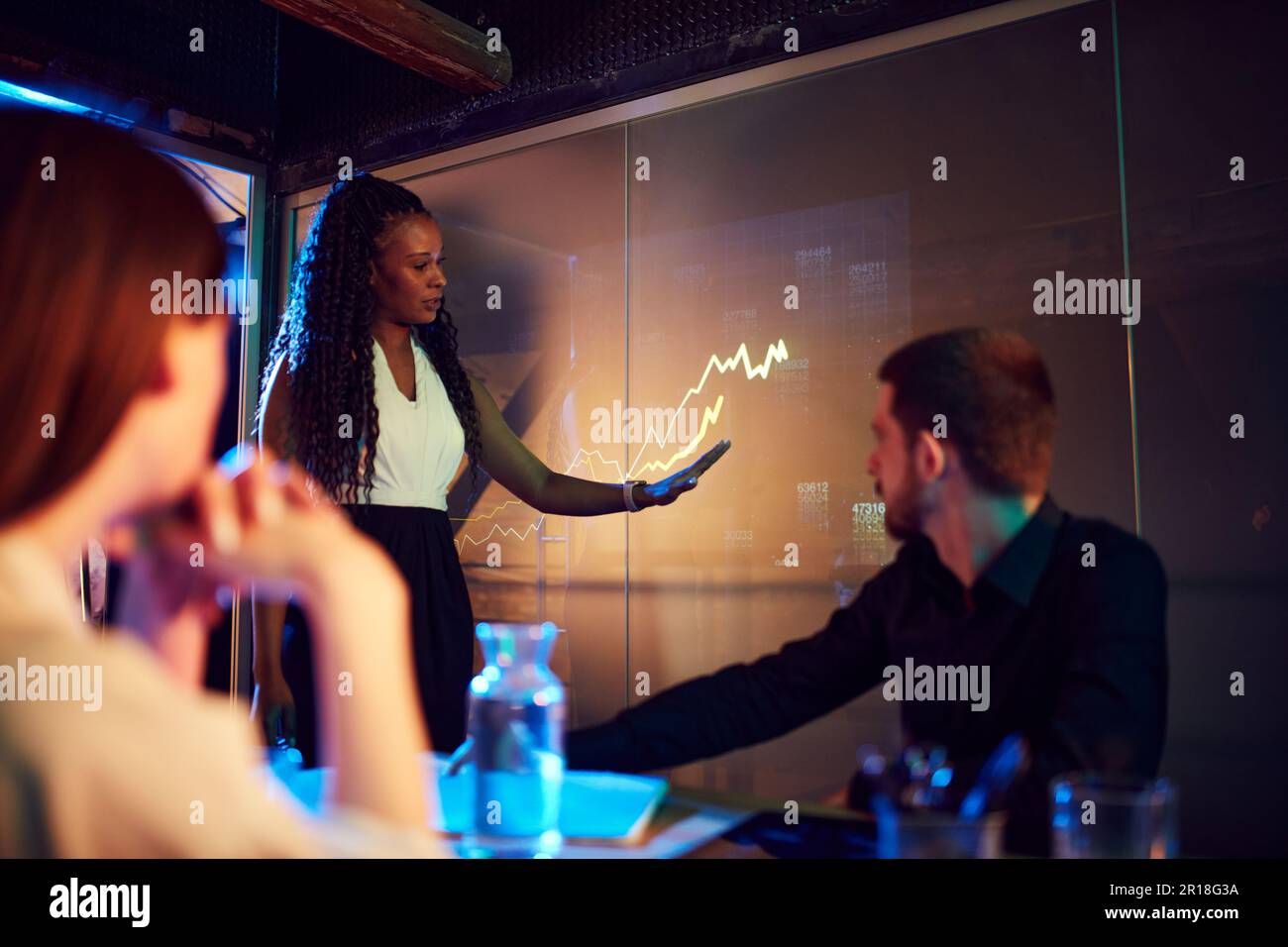 E-commerce. Business woman leading presentation during business meeting ...