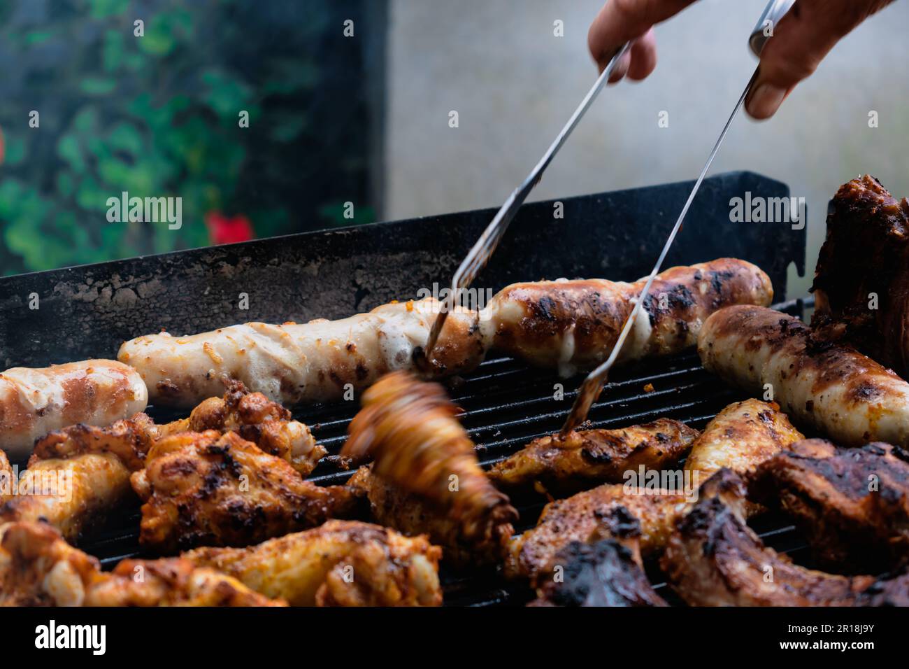 Cook put chicken meat on hi-res stock photography and images - Alamy