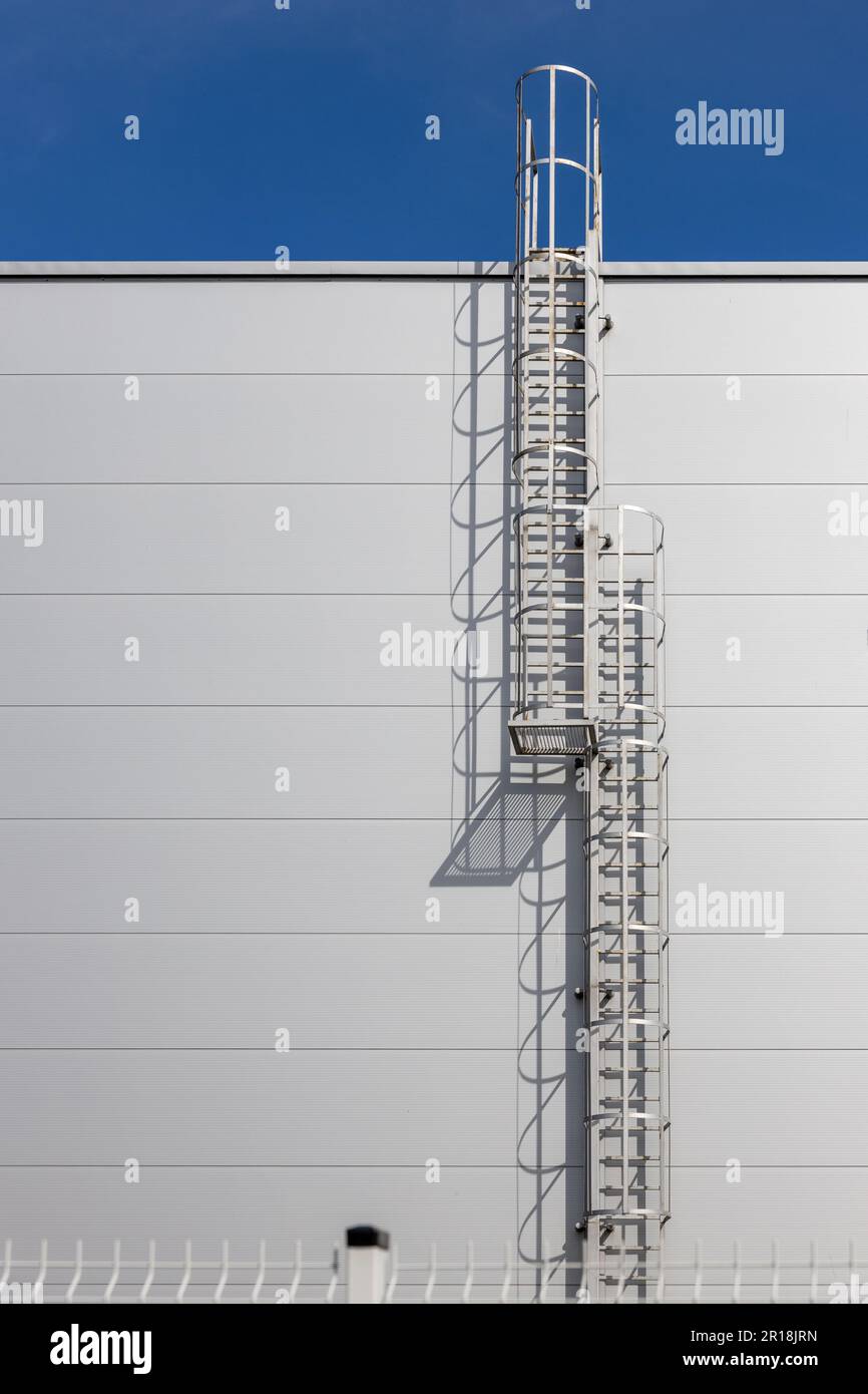 fire escape stairs on a building symbolize safety and development ...