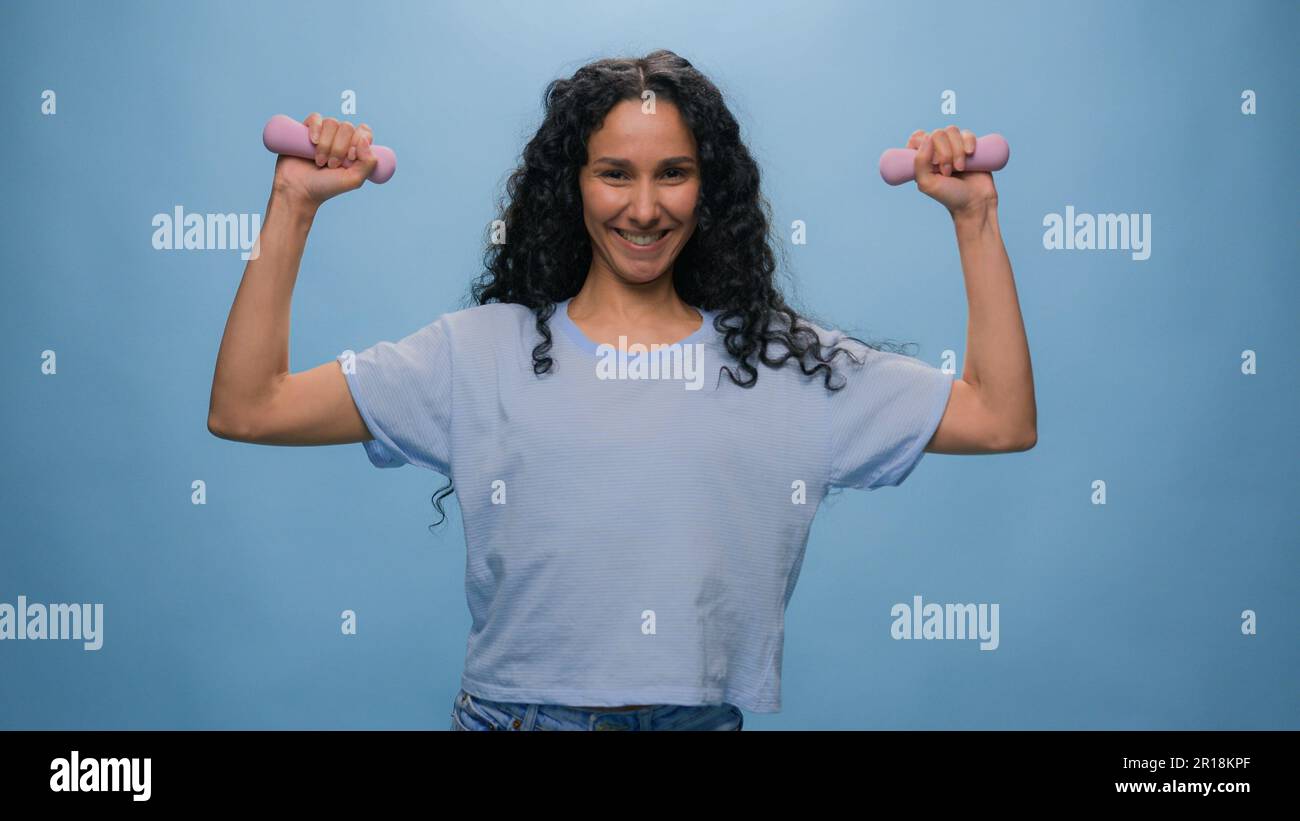 Happy woman strong Indian girl Hispanic smiling female model show hands ...