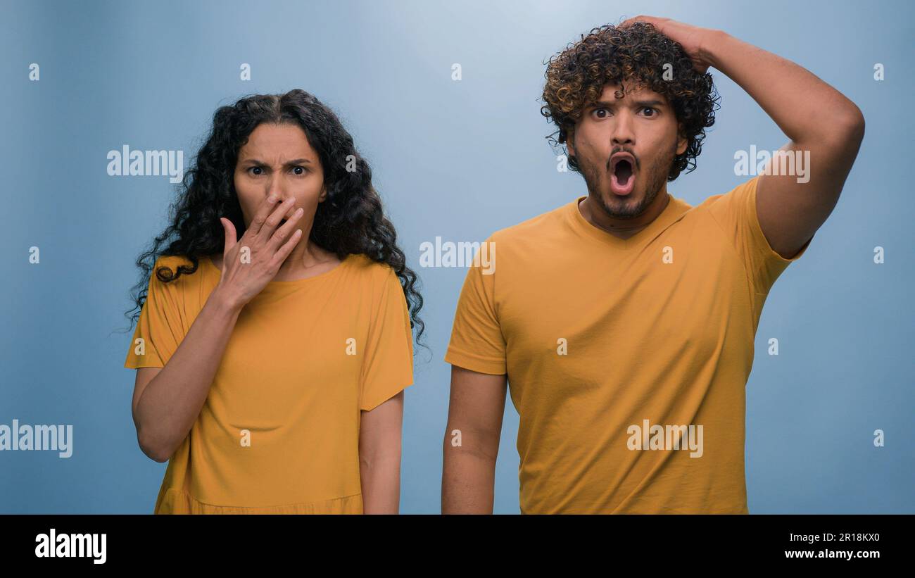 Multiracial couple amazed shocked Hispanic woman girl Indian man guy ...