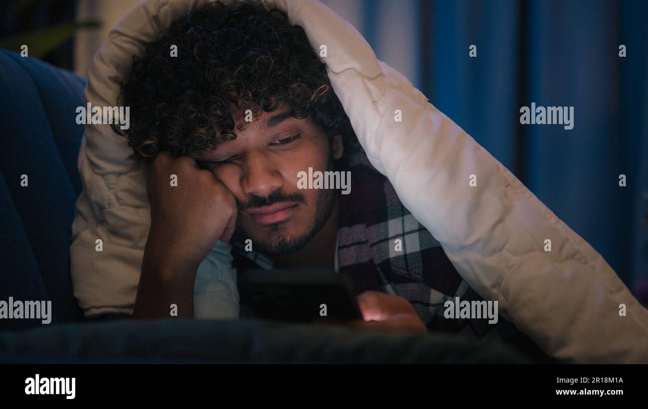 Sad sleepy guy Latino tired man upset Arabian sleeping napping boring ...