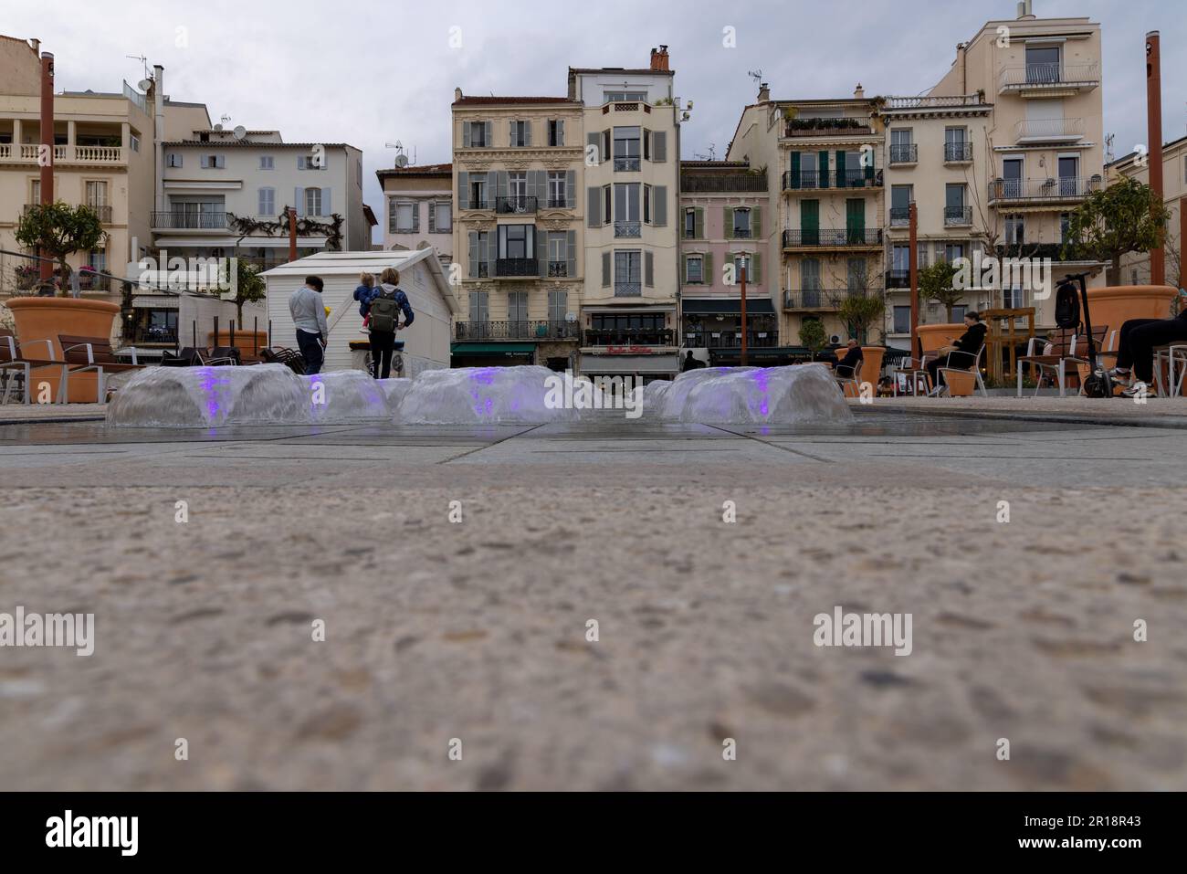 The Cannes, France, Cannes downtown with cafes, fountains and shops in ...