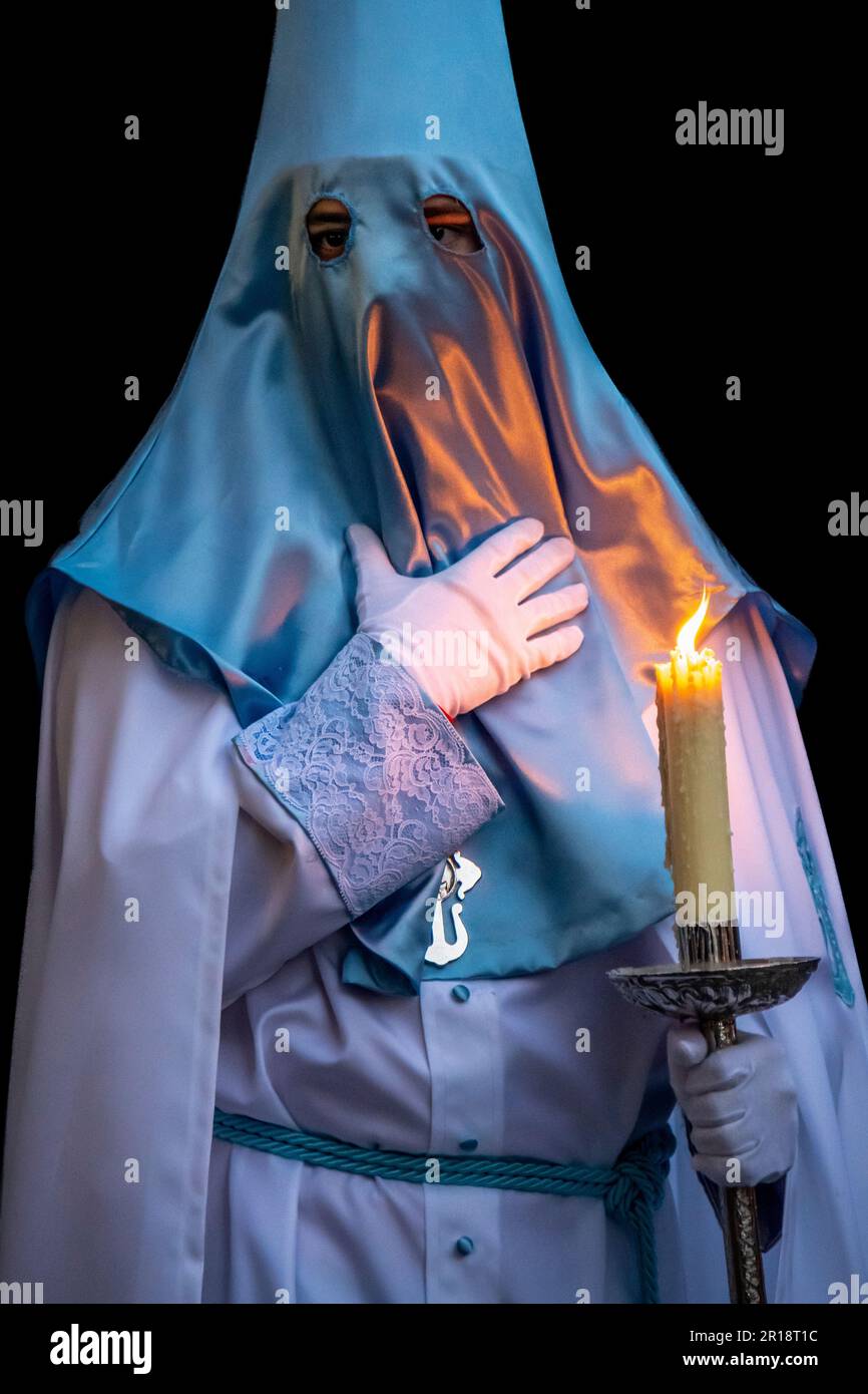 A Penitent of Hermandad Penitencial de Ntro. Padre Jesús Atado a la ...