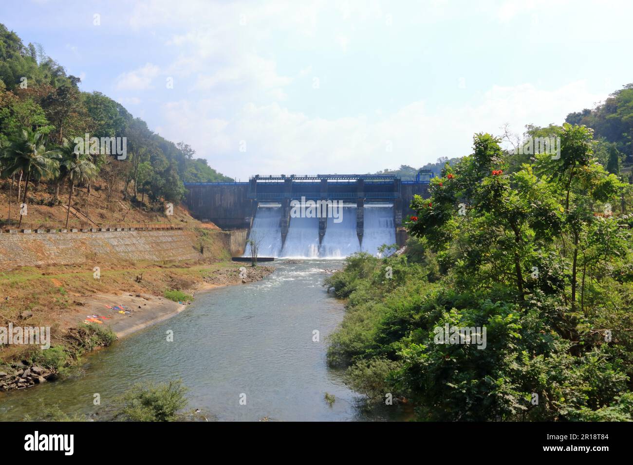 Water rushing through gates at the peruvannamuzhi (peruvannamoozhi) dam ...