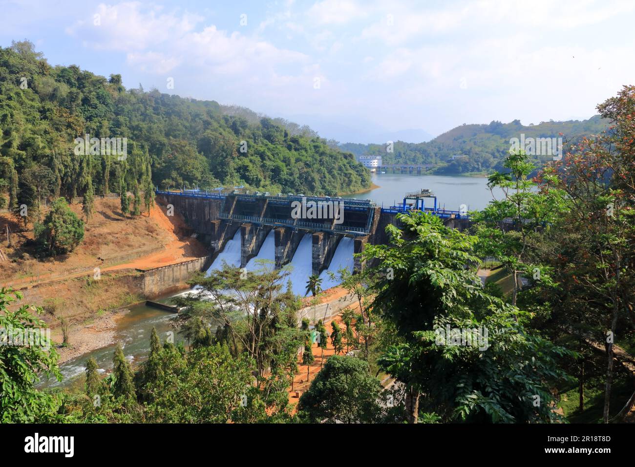 Water rushing through gates at the peruvannamuzhi (peruvannamoozhi) dam ...
