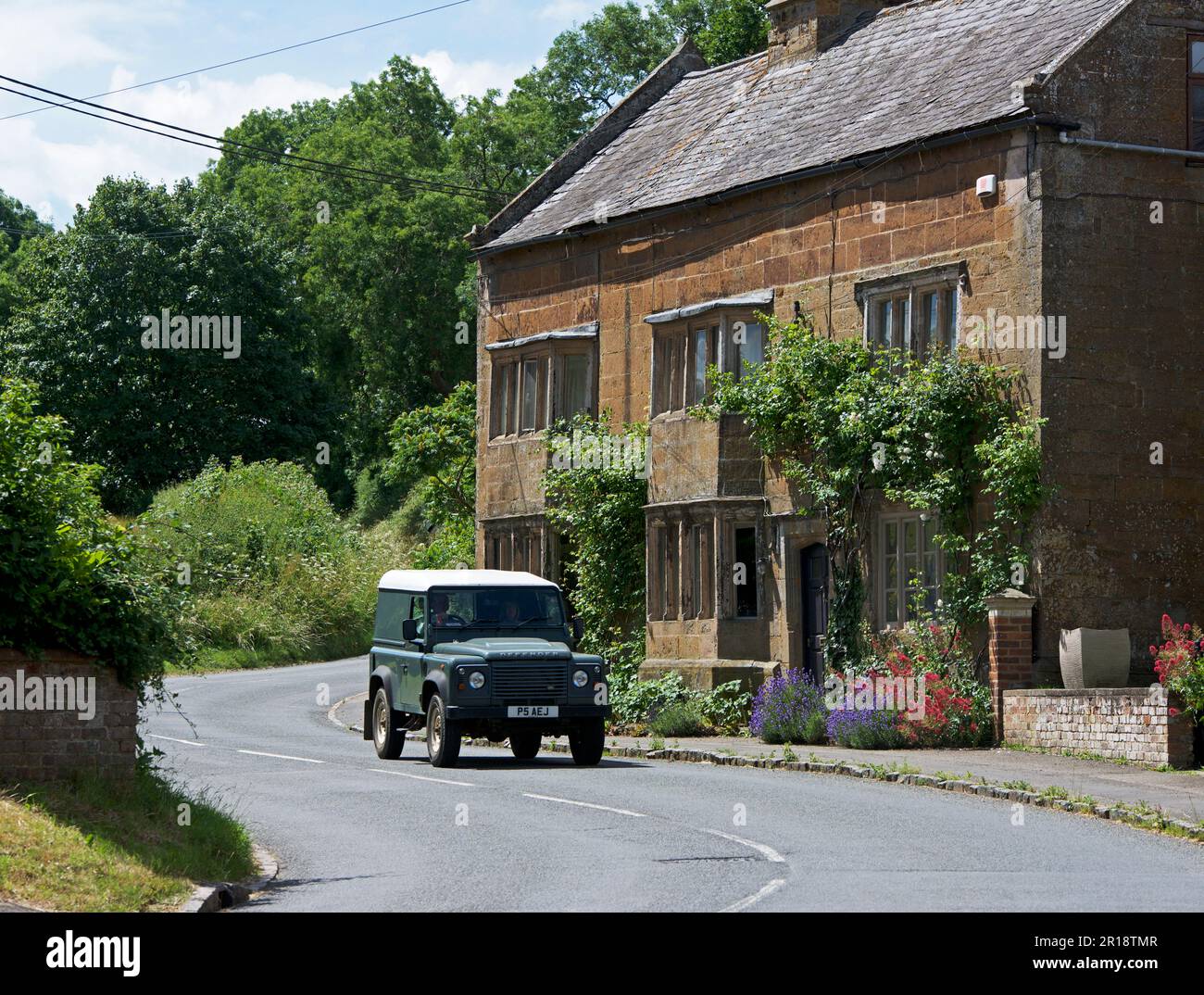 Land Rover Defender in the village of Weston by Welland ...