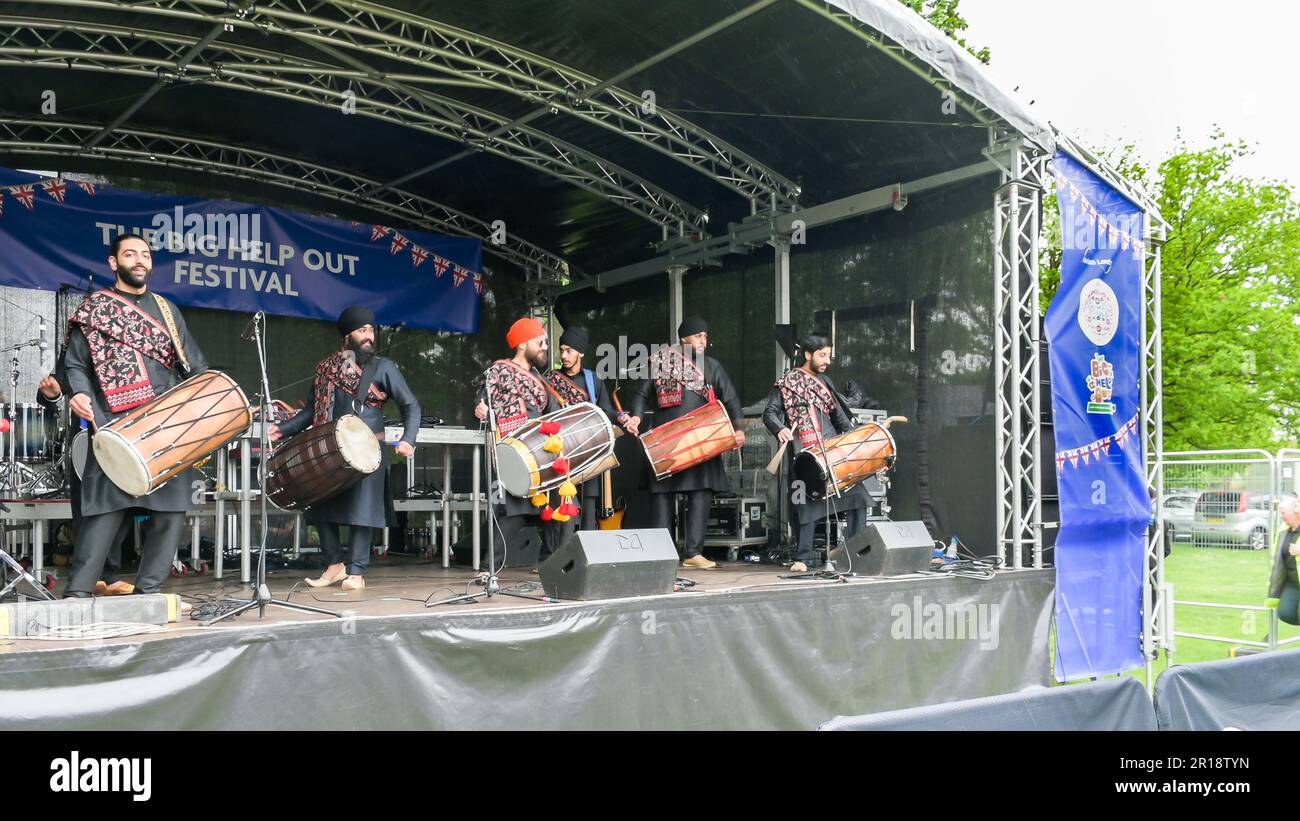 Men playing drum (Dhol) in Big Help Out Festival Stock Photo - Alamy