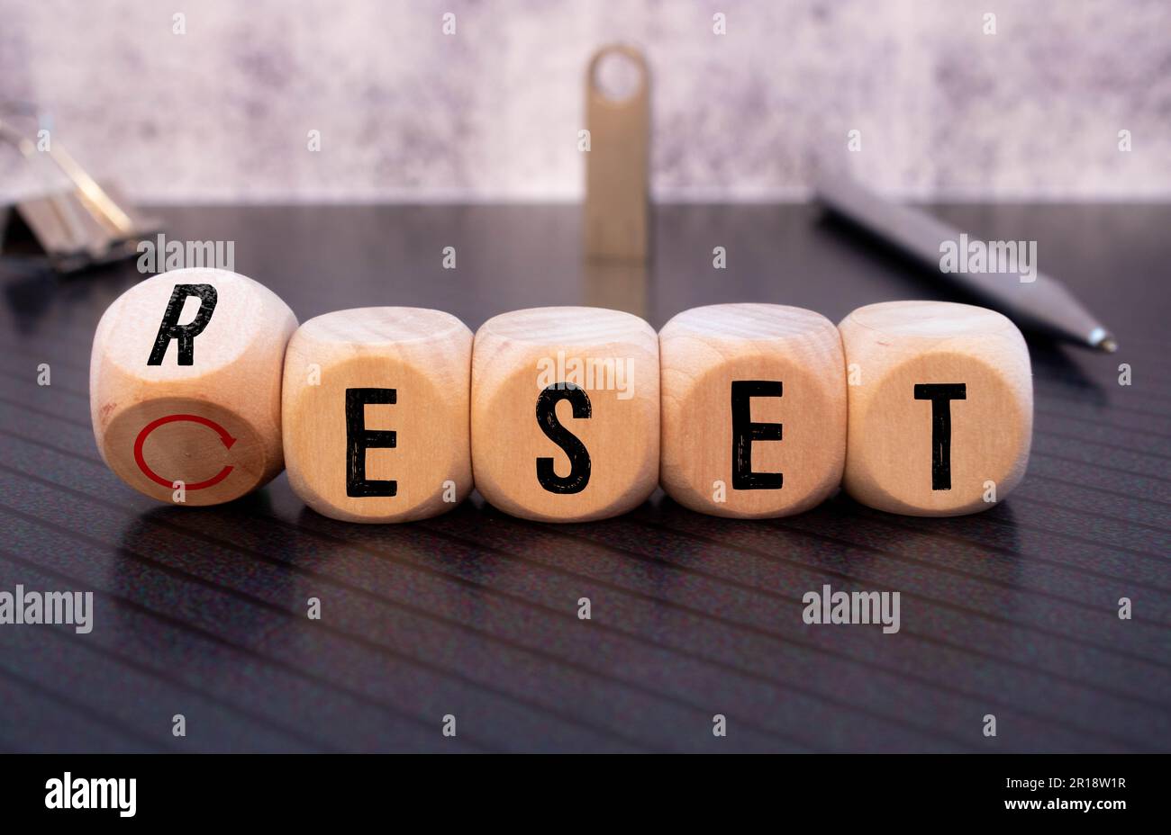Reset symbol. The concept word 'reset' on wooden cubes. Beautiful white ...