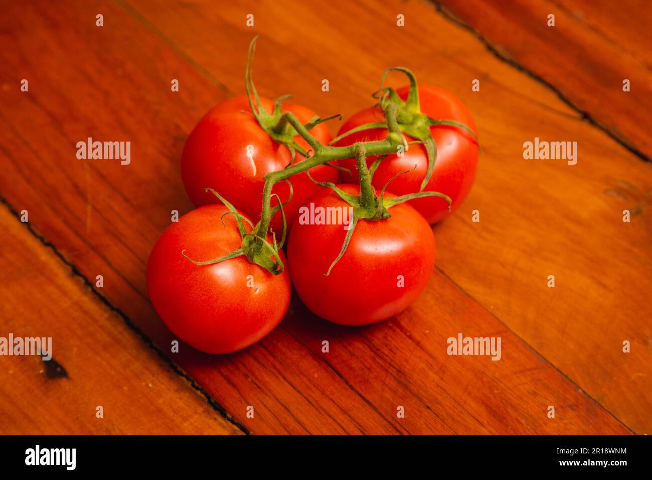 Four tomatoes hi-res stock photography and images - Alamy