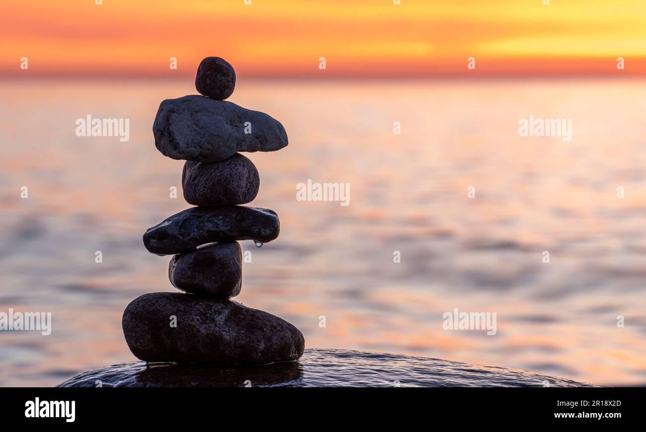 Stone pyramids on the dreamy Baltic Sea sandy beach on Rügen to the ...