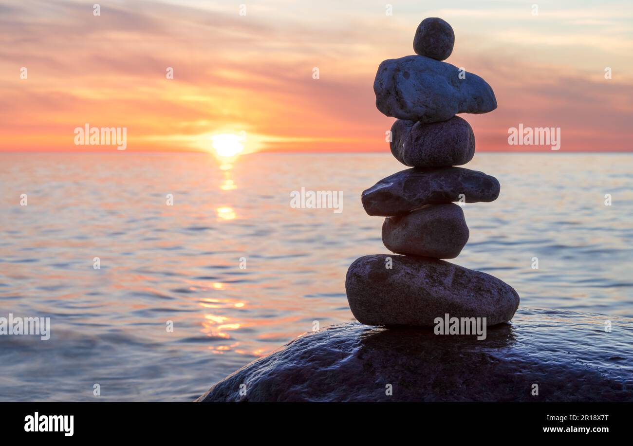 Stone pyramids on the dreamy Baltic Sea sandy beach on Rügen to the ...