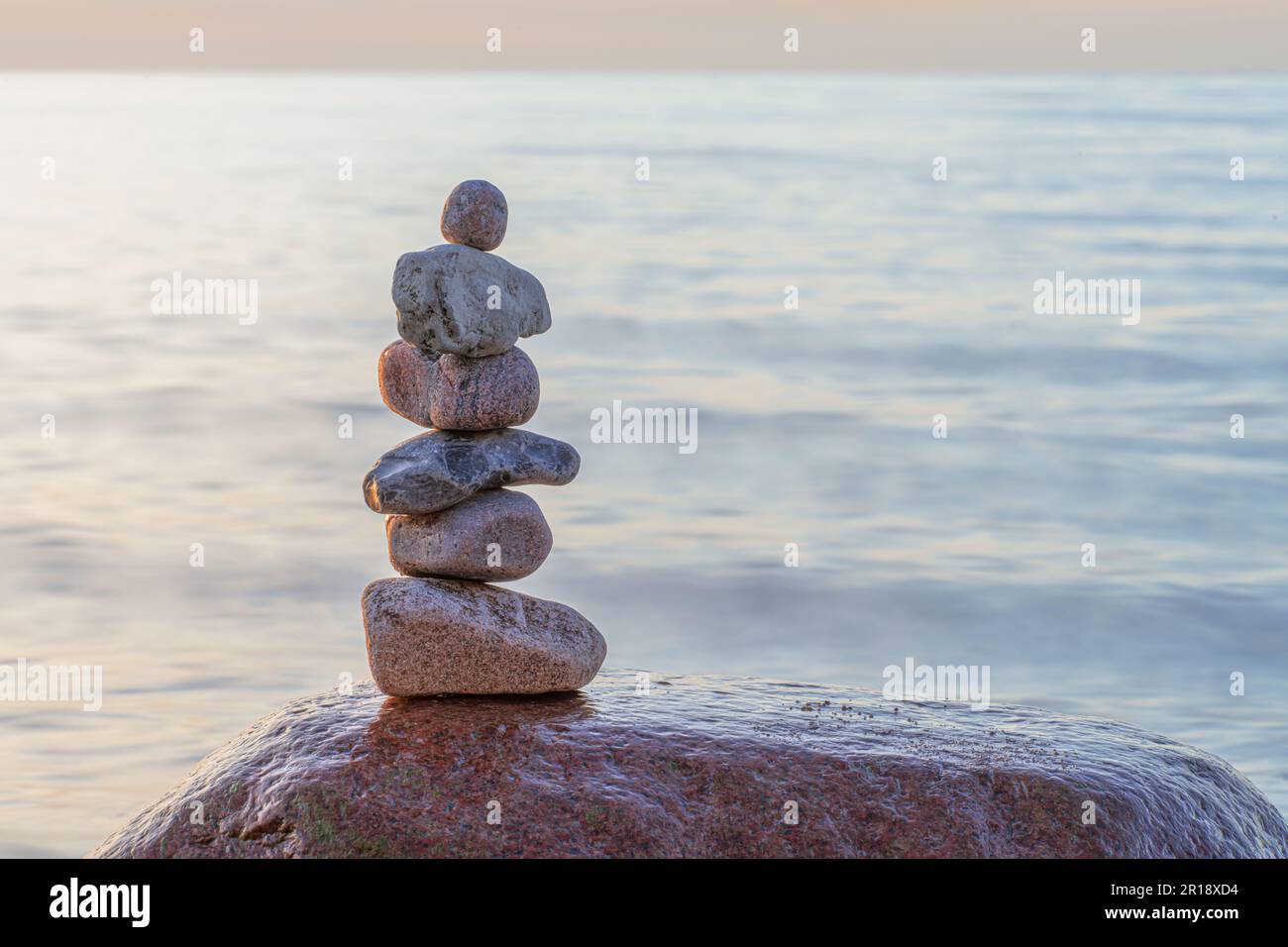 Stone pyramids on the dreamy Baltic Sea sandy beach on Rügen to the ...
