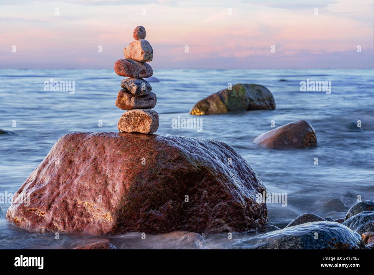 Stone pyramids on the dreamy Baltic Sea sandy beach on Rügen to the ...