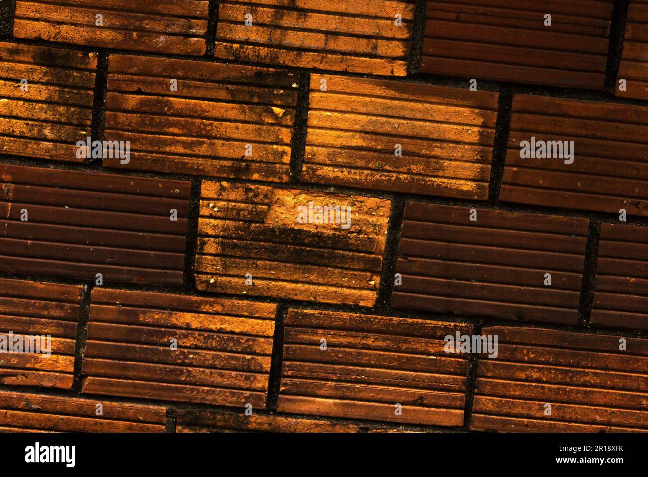 Old brick wall with black stains stuck. on the wall Stock Photo - Alamy