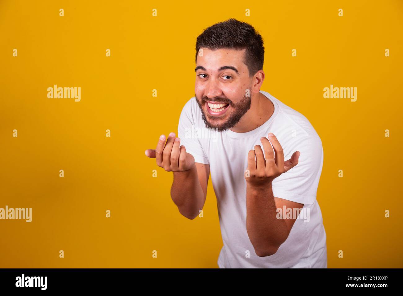 Brazilian Latin American man, with gesture calling, come, come ...