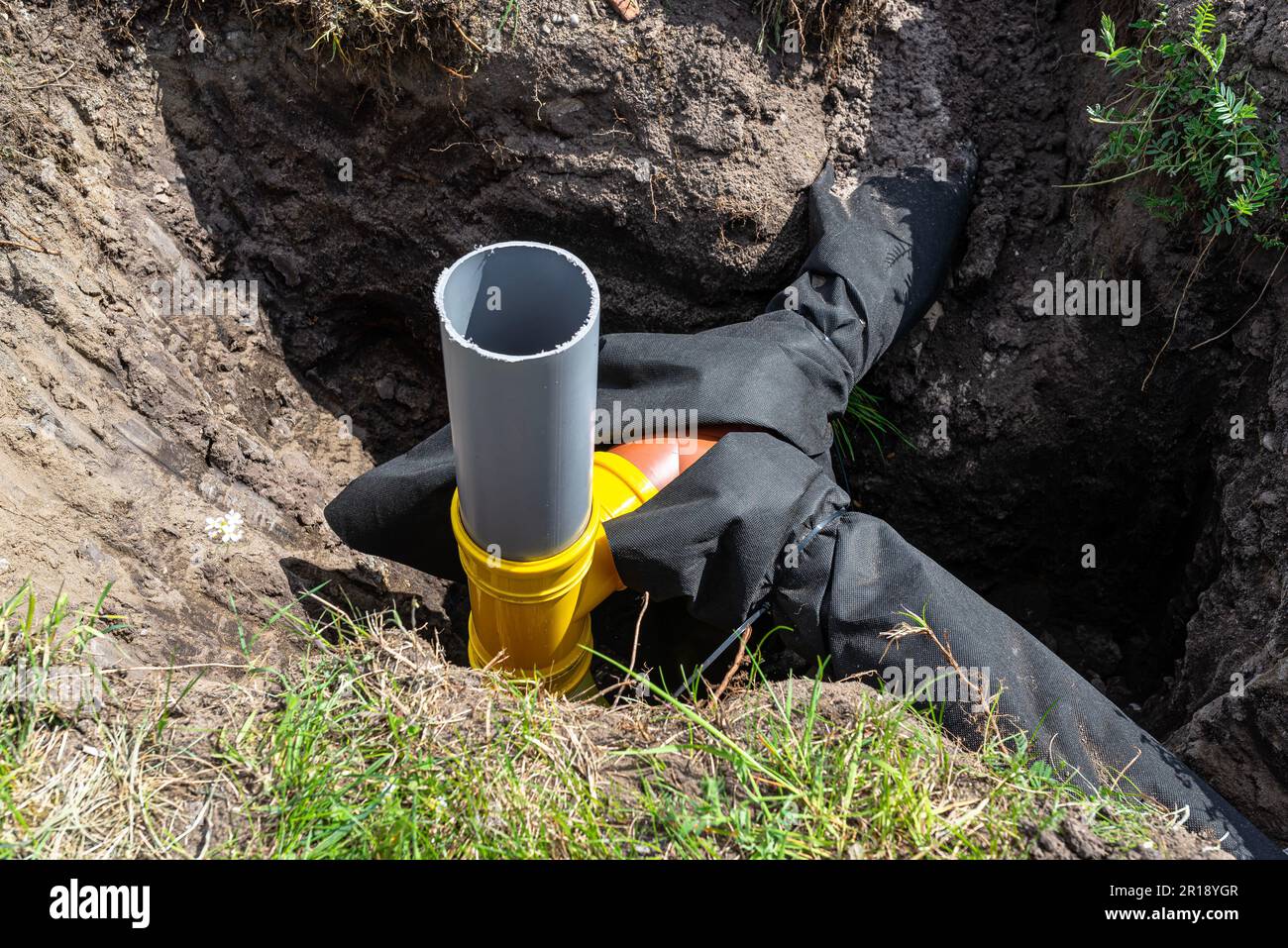 Overflow and infiltration well connected to drainage pipes, dug in a ...