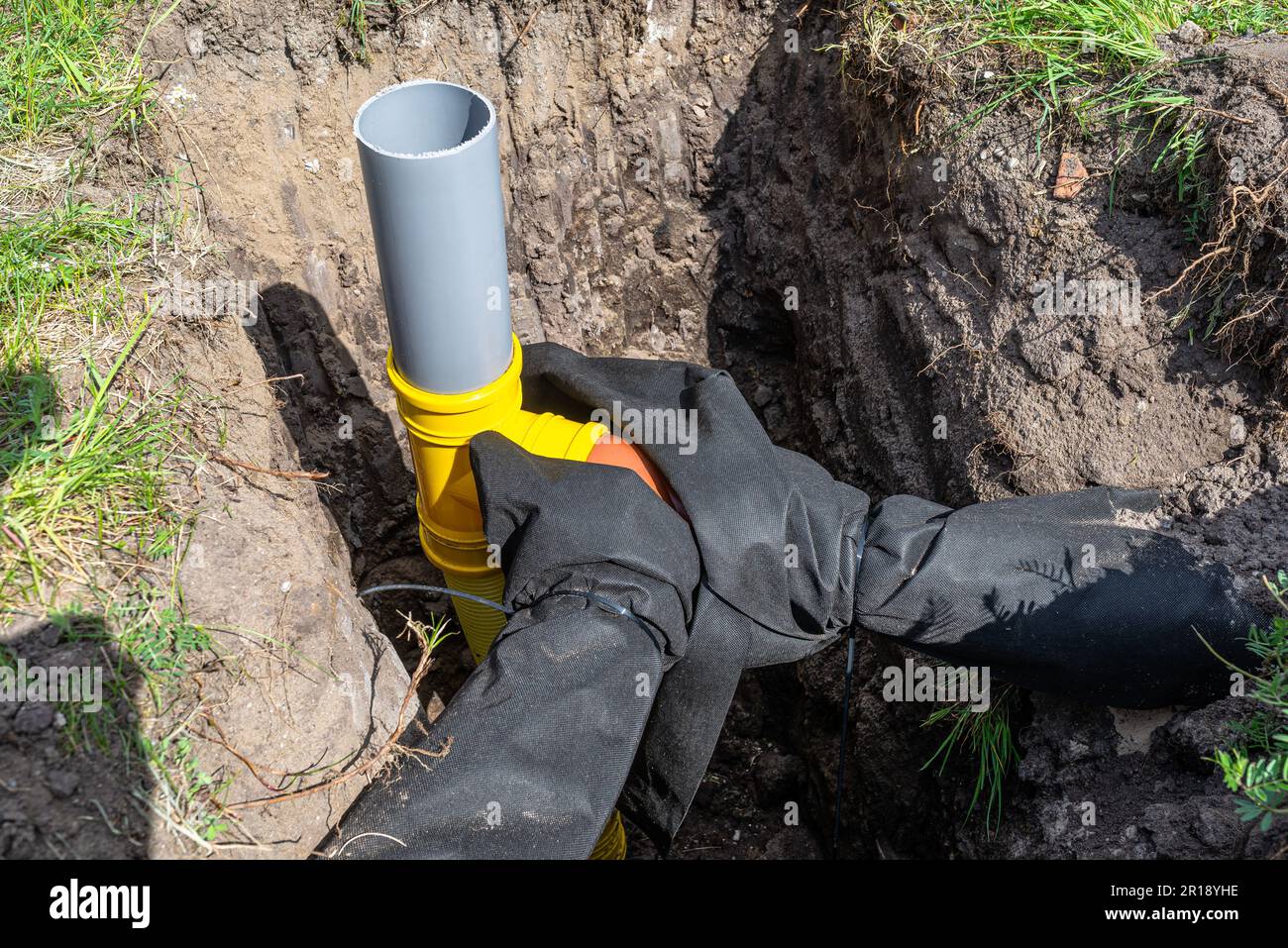Overflow and infiltration well connected to drainage pipes, dug in a ...