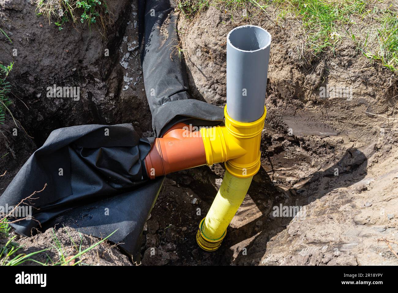 Overflow and infiltration well connected to drainage pipes, dug in a ...