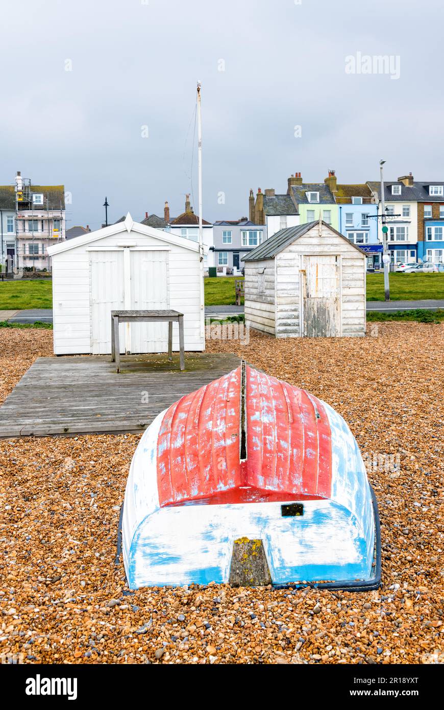 Fishing boat and beach huts in Walmer, near Deal, Kent, England Stock ...