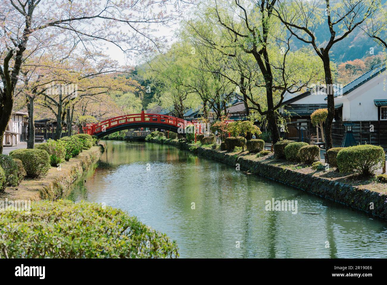 Red bridge over the river in edo wonderland, japan Stock Photo - Alamy