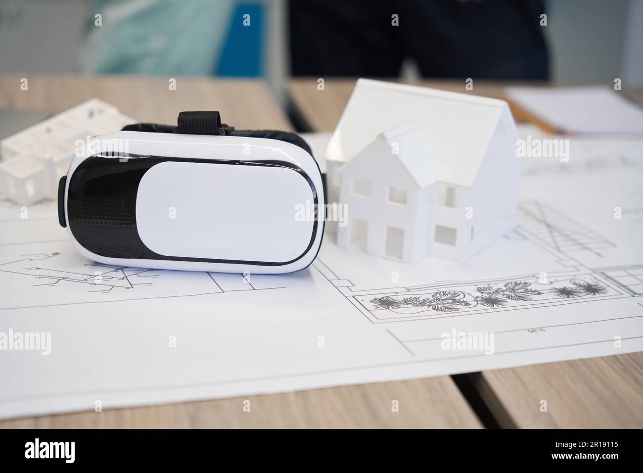 Virtual reality headset lying on house blueprint Stock Photo - Alamy