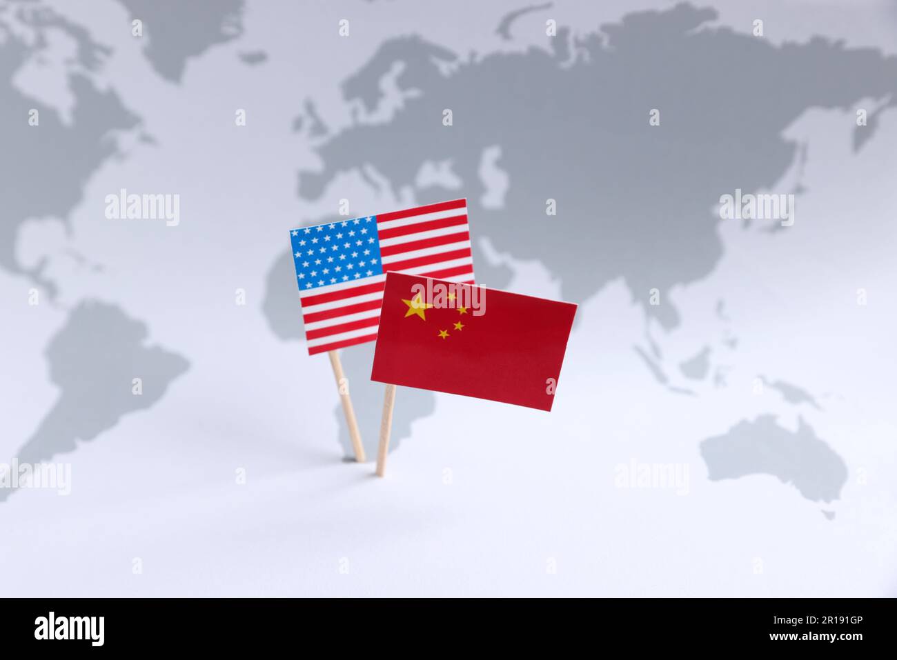 American and Chinese flags on world map. Trade war concept Stock Photo ...