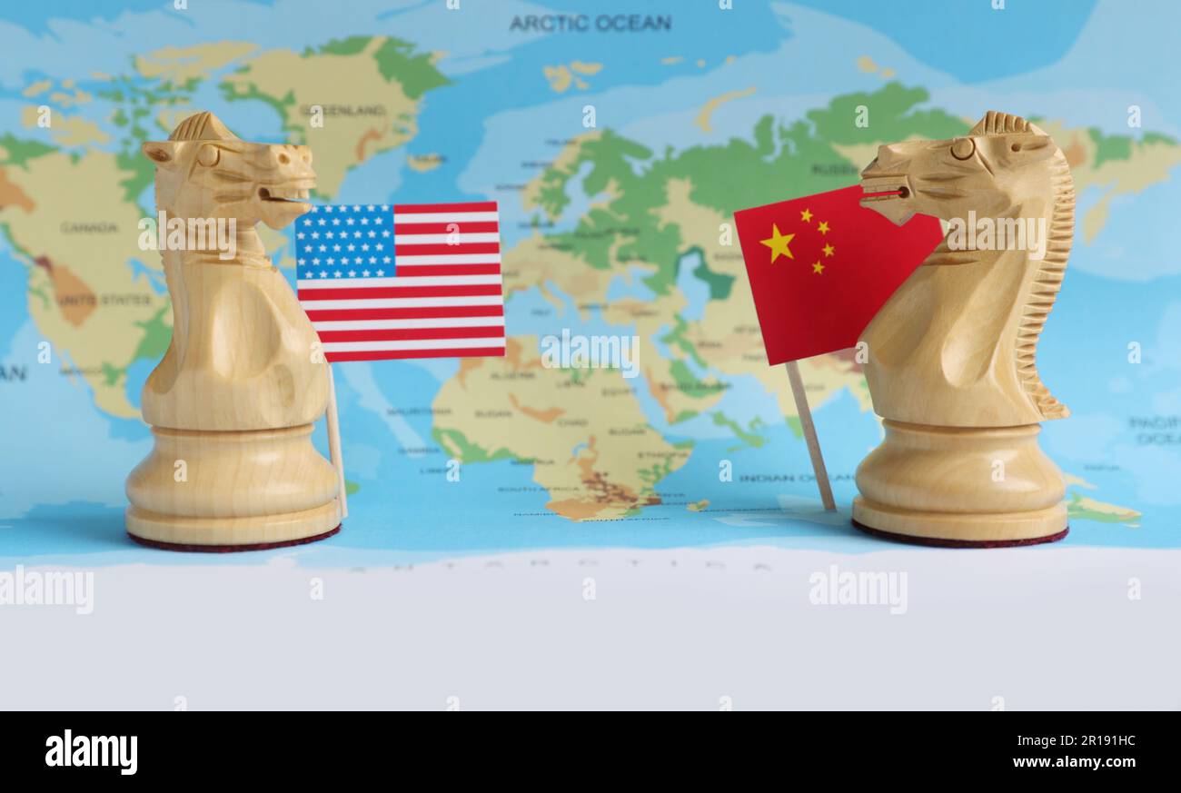 Chess pieces, American and Chinese flags on world map. Trade war ...